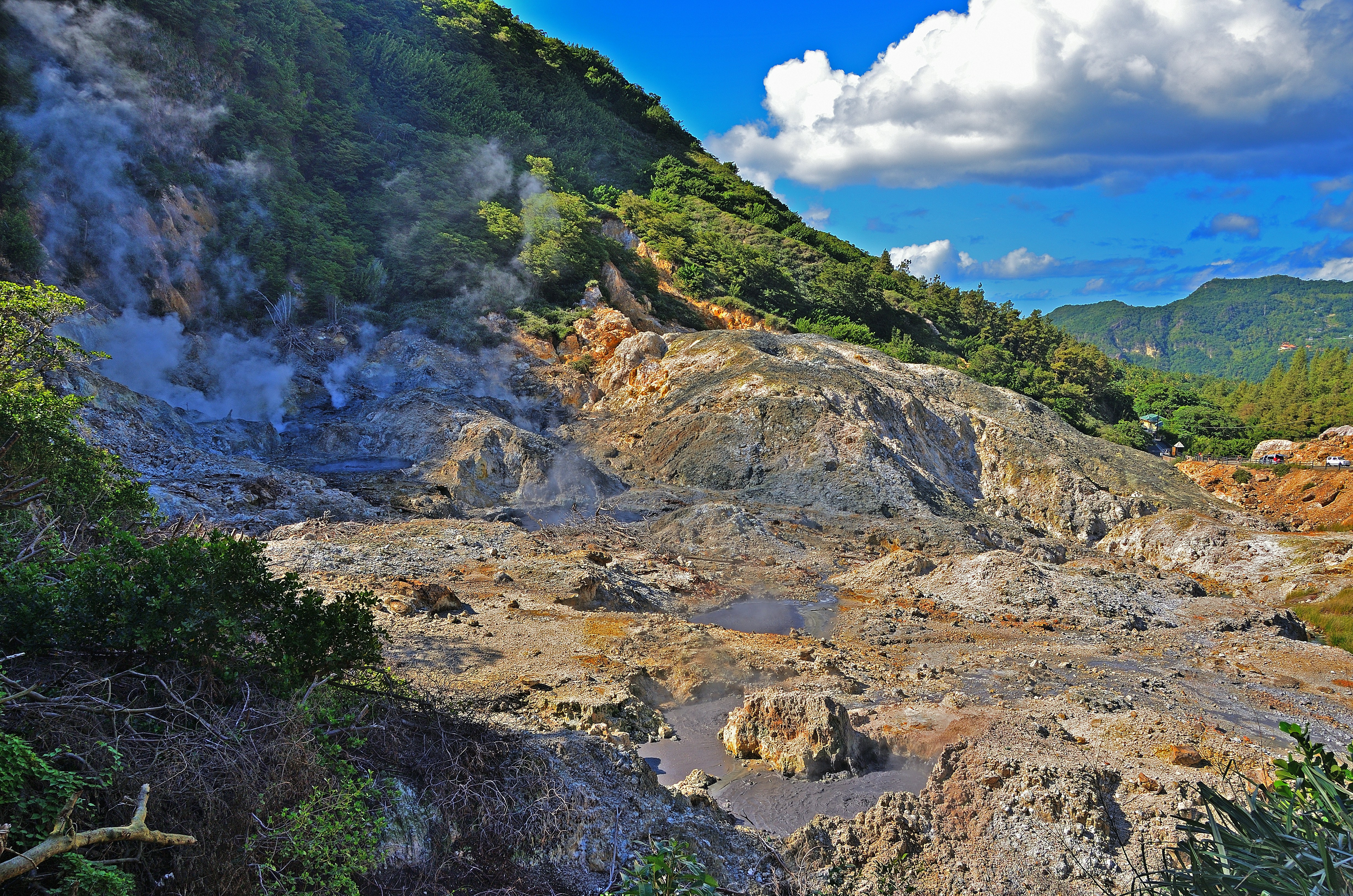 Steam Veins Over a Rugged Geothermal Plain Under a Crisp Blue Sky
