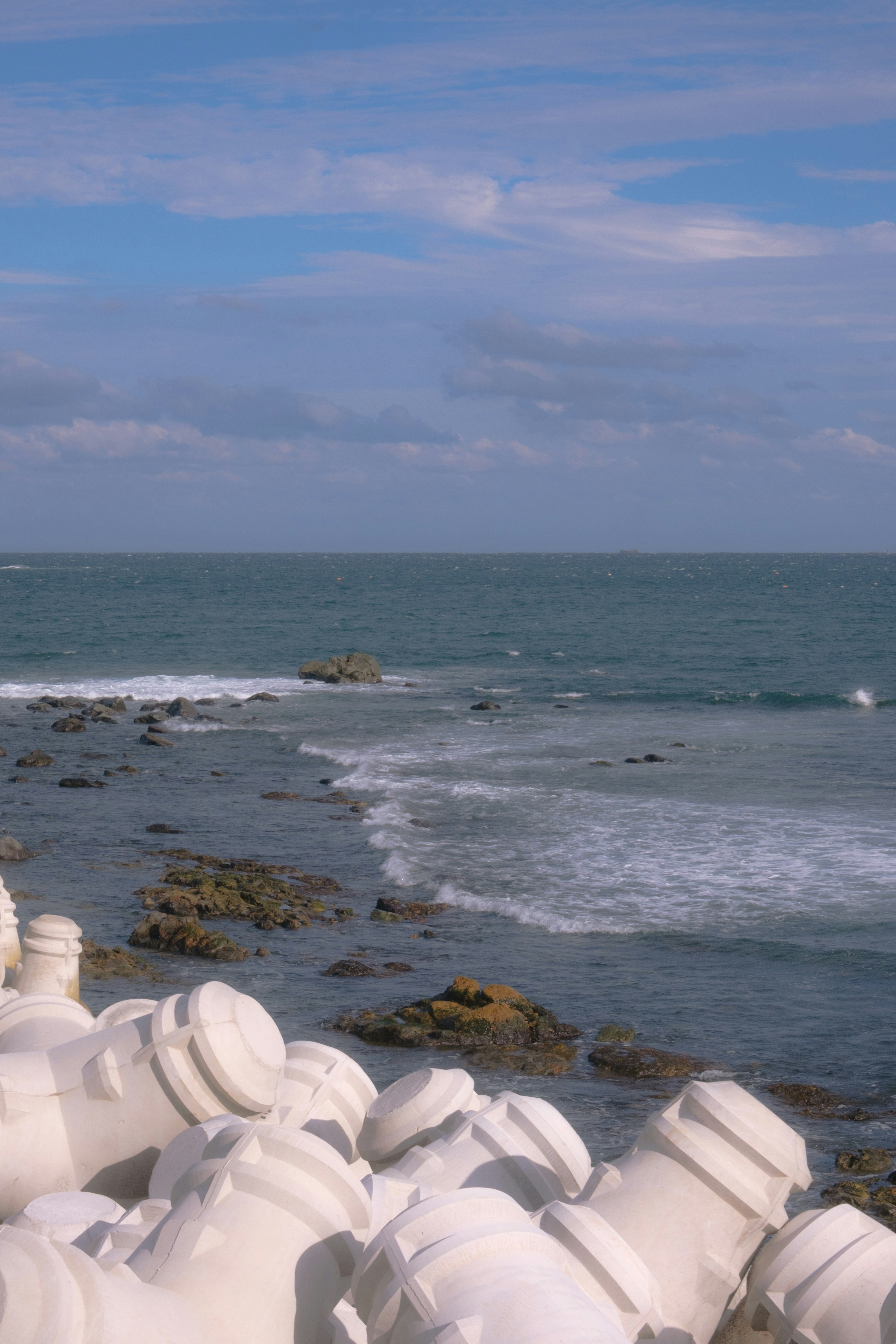 Blue Horizon and White Bastions: Breakwaters Guarding a Rocky Seaboardalina ozerova