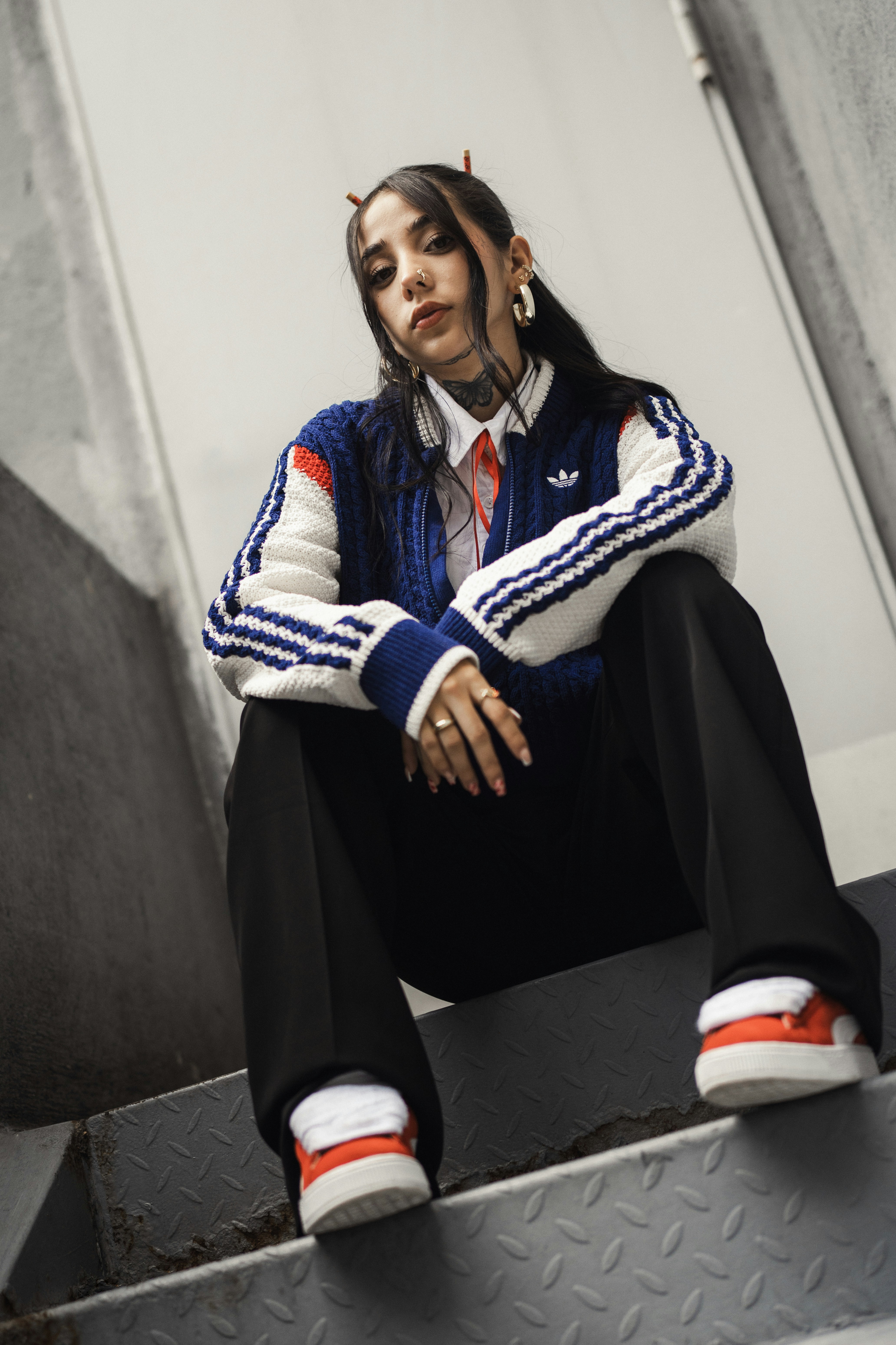 A stylish woman poses in an adidas jacket. photo – Free Woman Image on ...