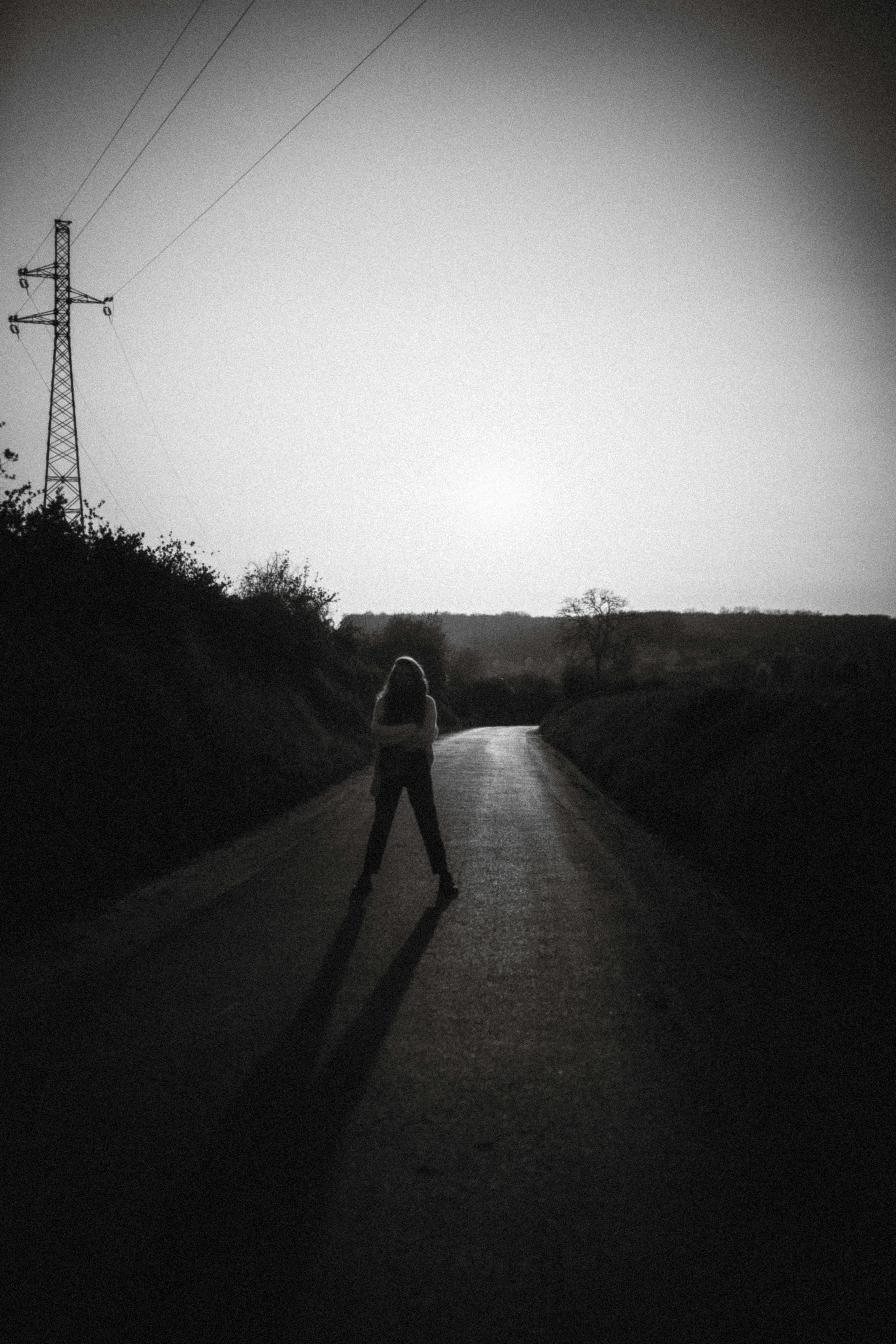 Silhouette of Solitude on an Endless Road