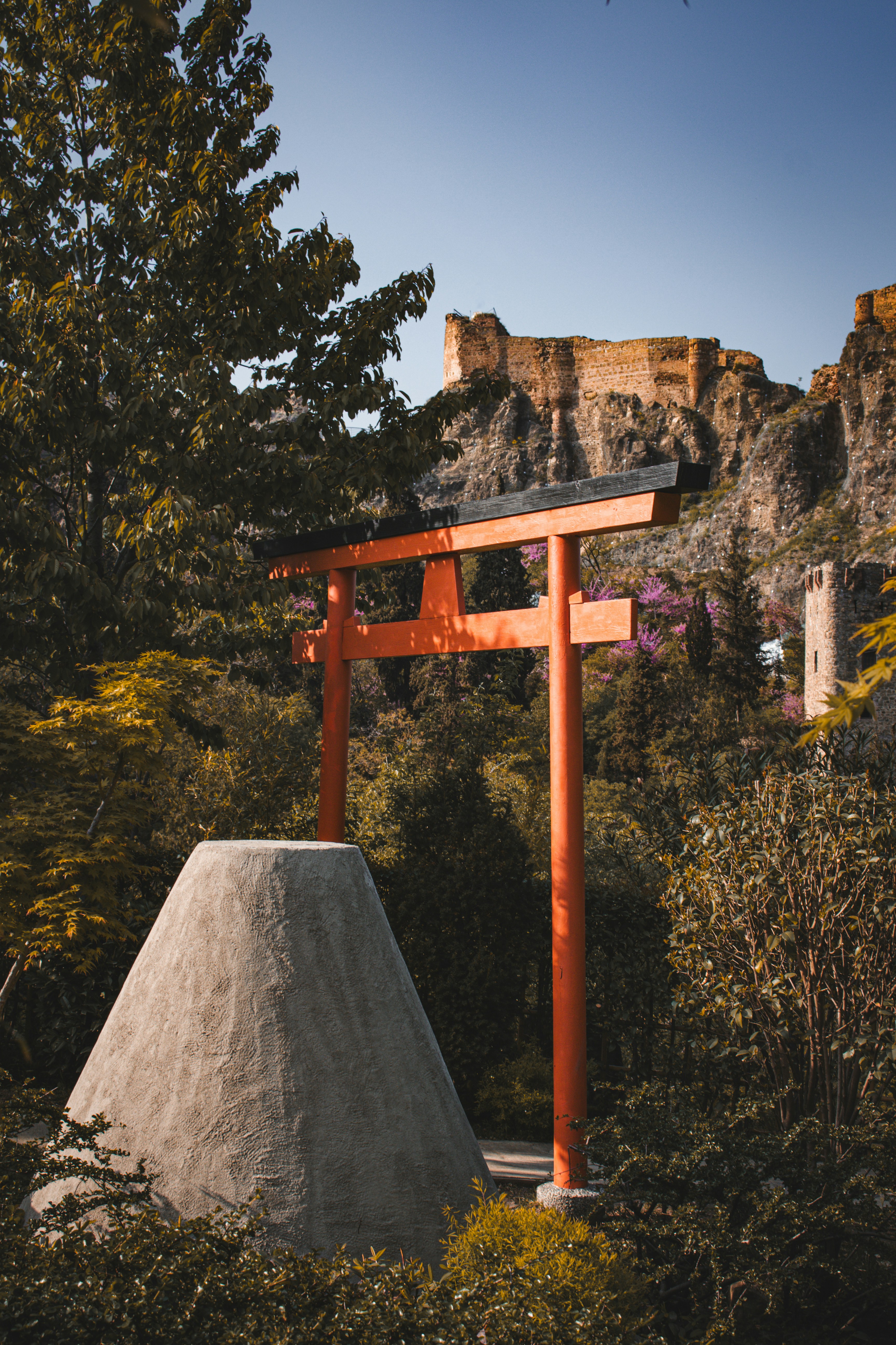 Scarlet Torii Framing Autumn Light Over Ancient Ruins