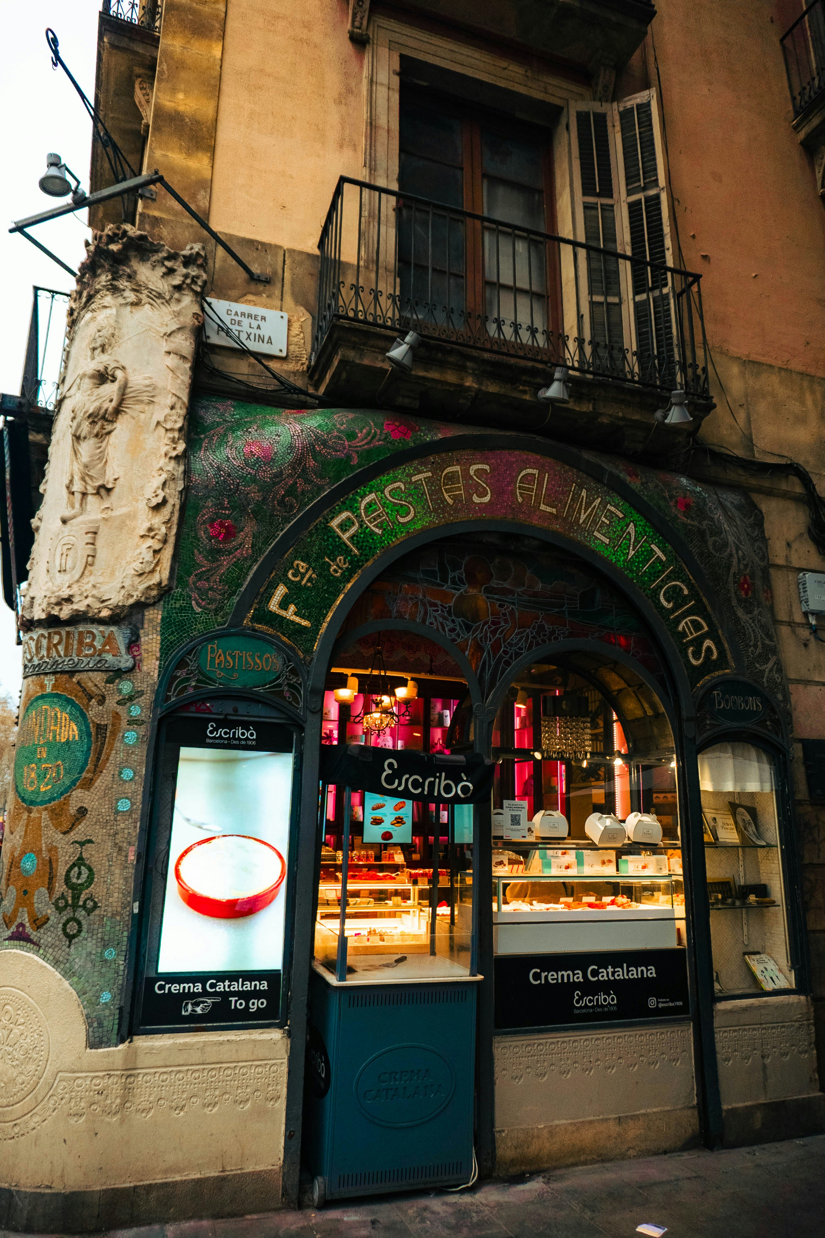 Mosaic Archway Bakery: Warm Light Through a Weathered Facade
