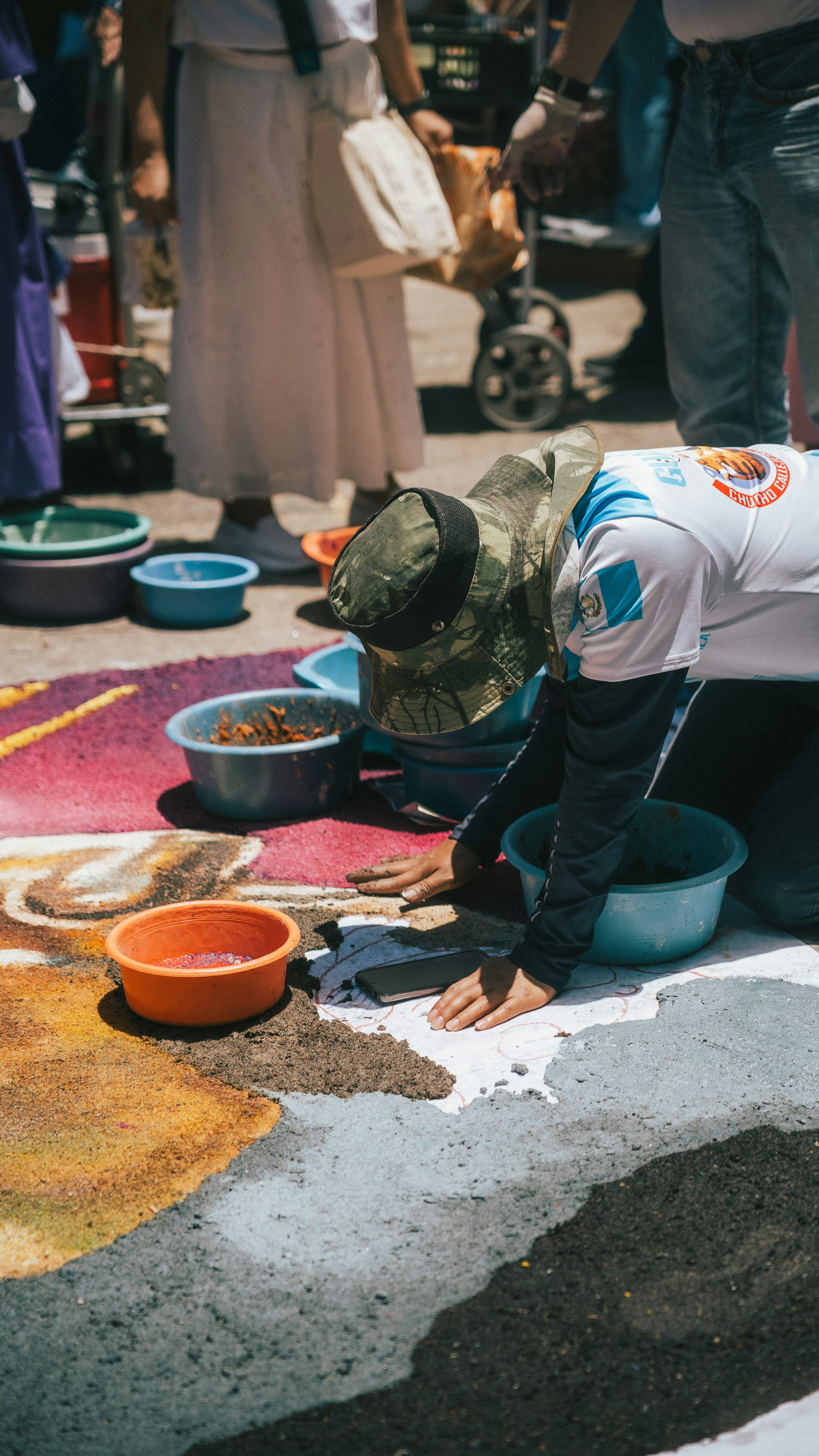 Brushed Sand and Chalk: Child’s Hands Leaving Imprints in a Street-art Scene