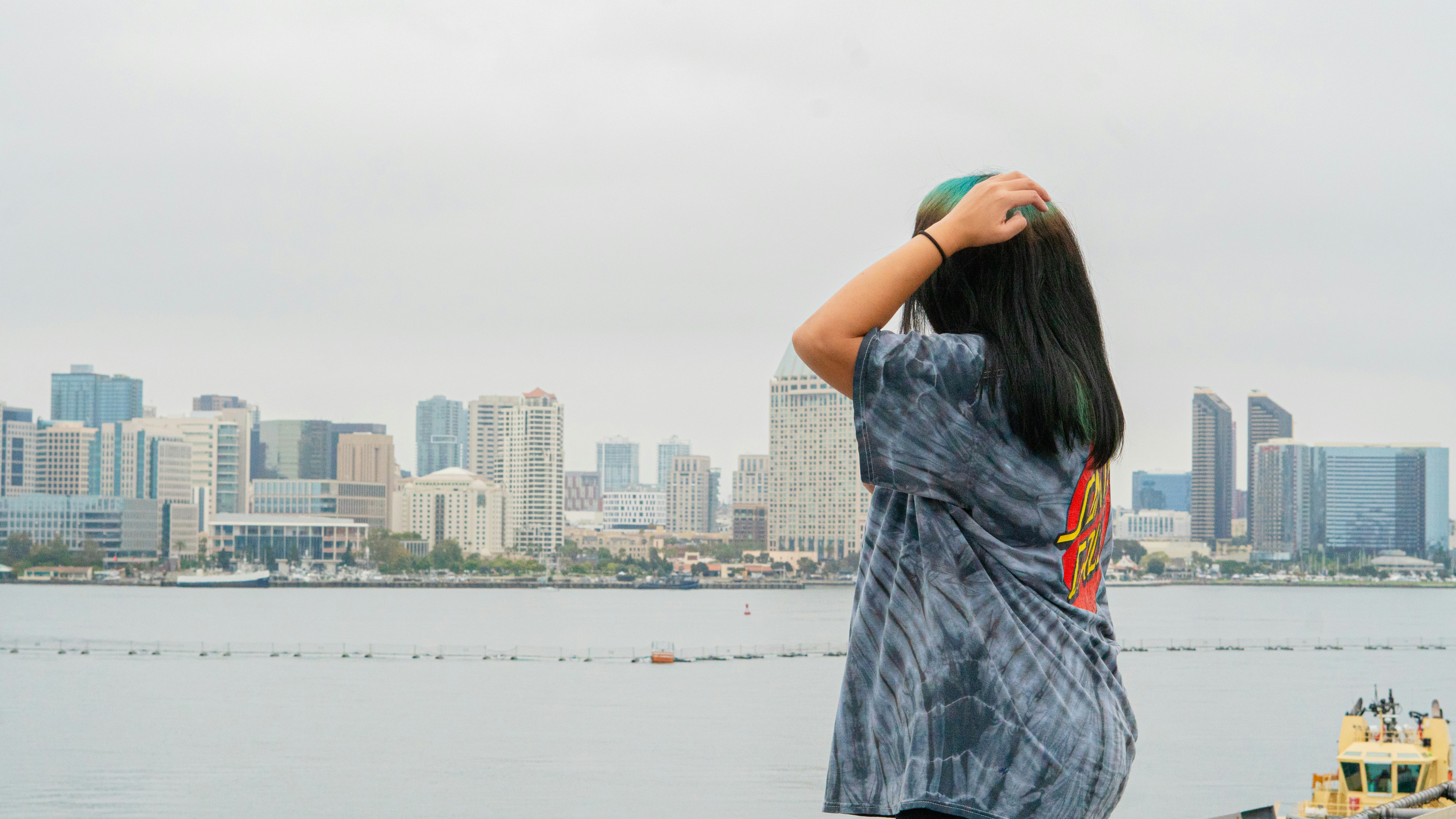 Urban Reflections: A Moment by the Water