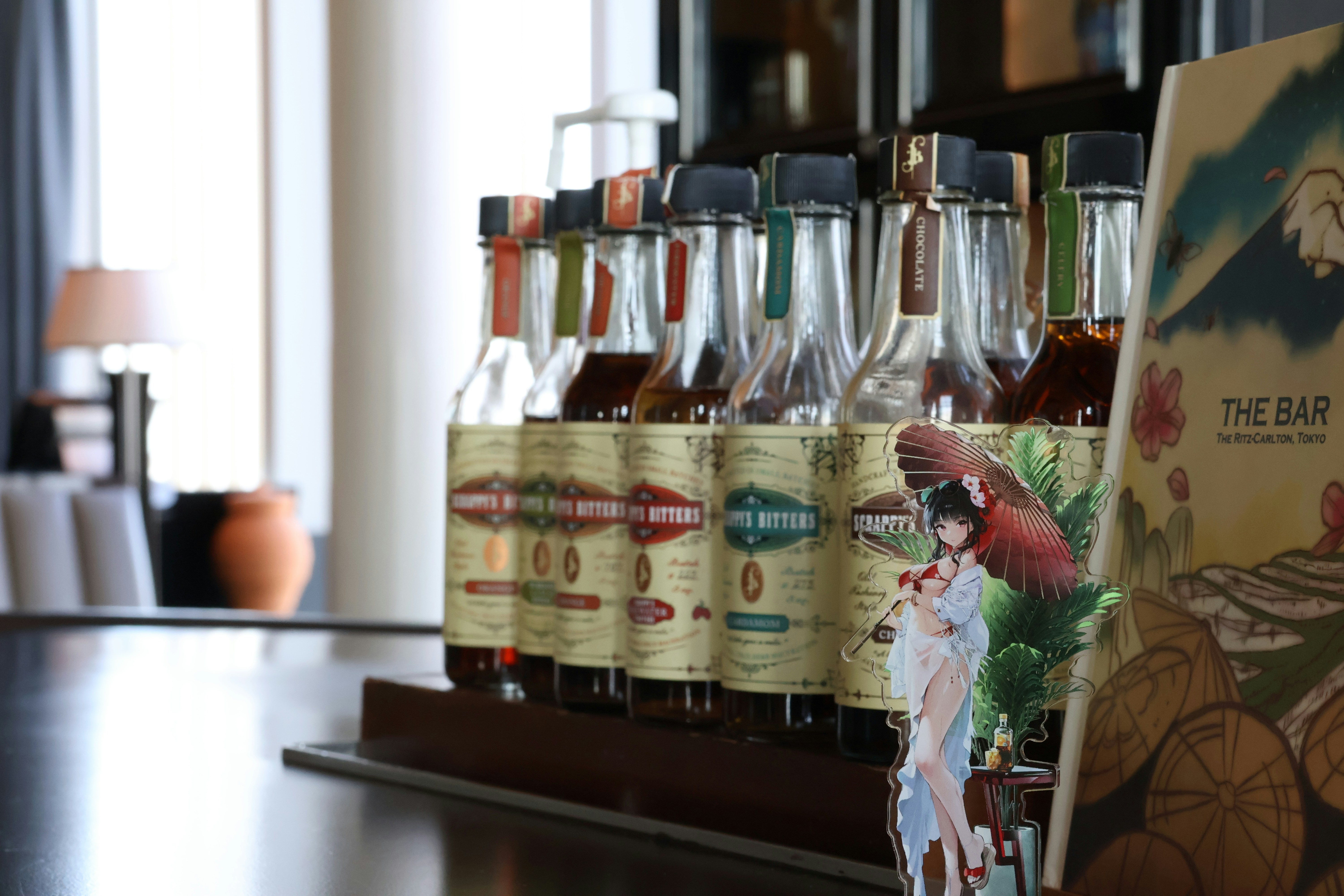 Tiny Cutouts, Big Flavor: A Bar Shelf with Colorful Bottles