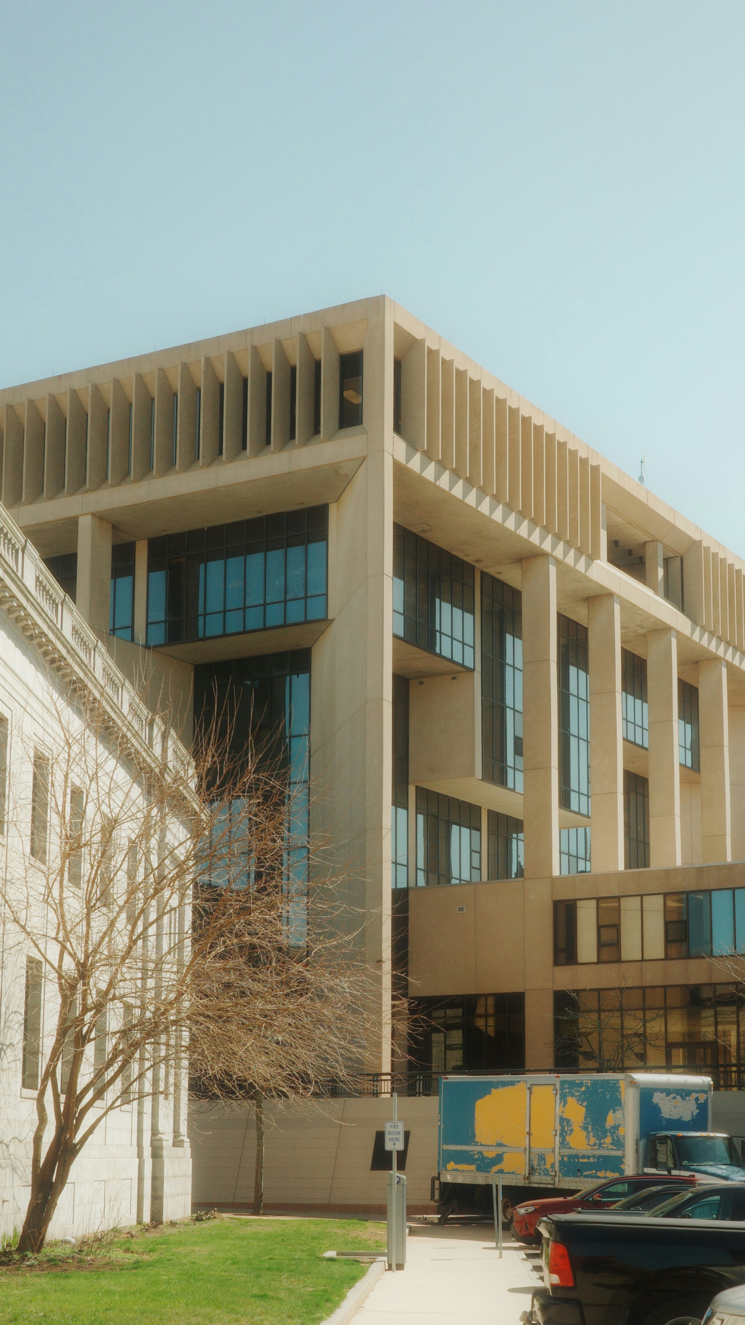 Concrete Geometry: A Modern Facade Reaching Toward the Sky