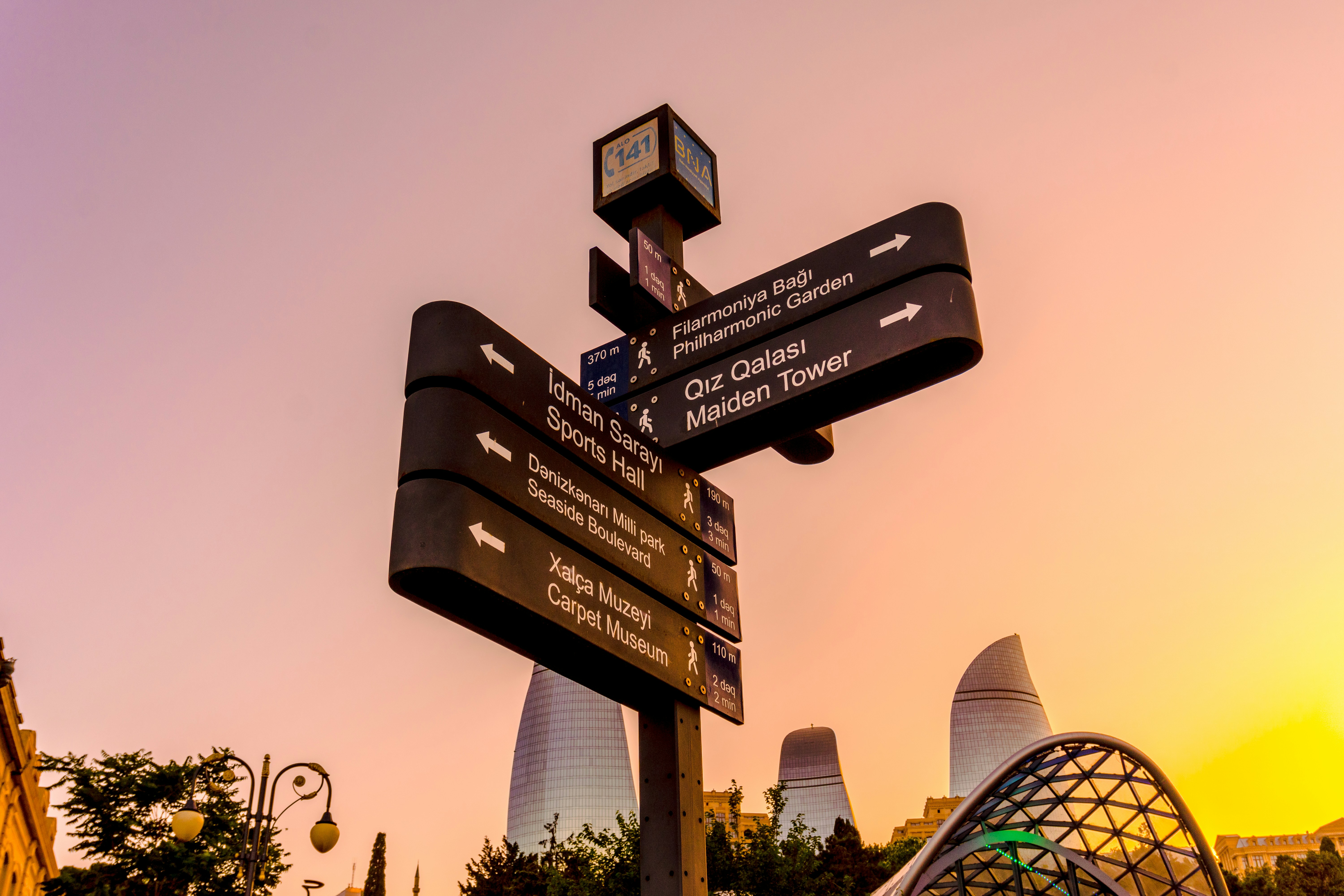 Direction signs point toward tourist attractions. photo – Free City ...