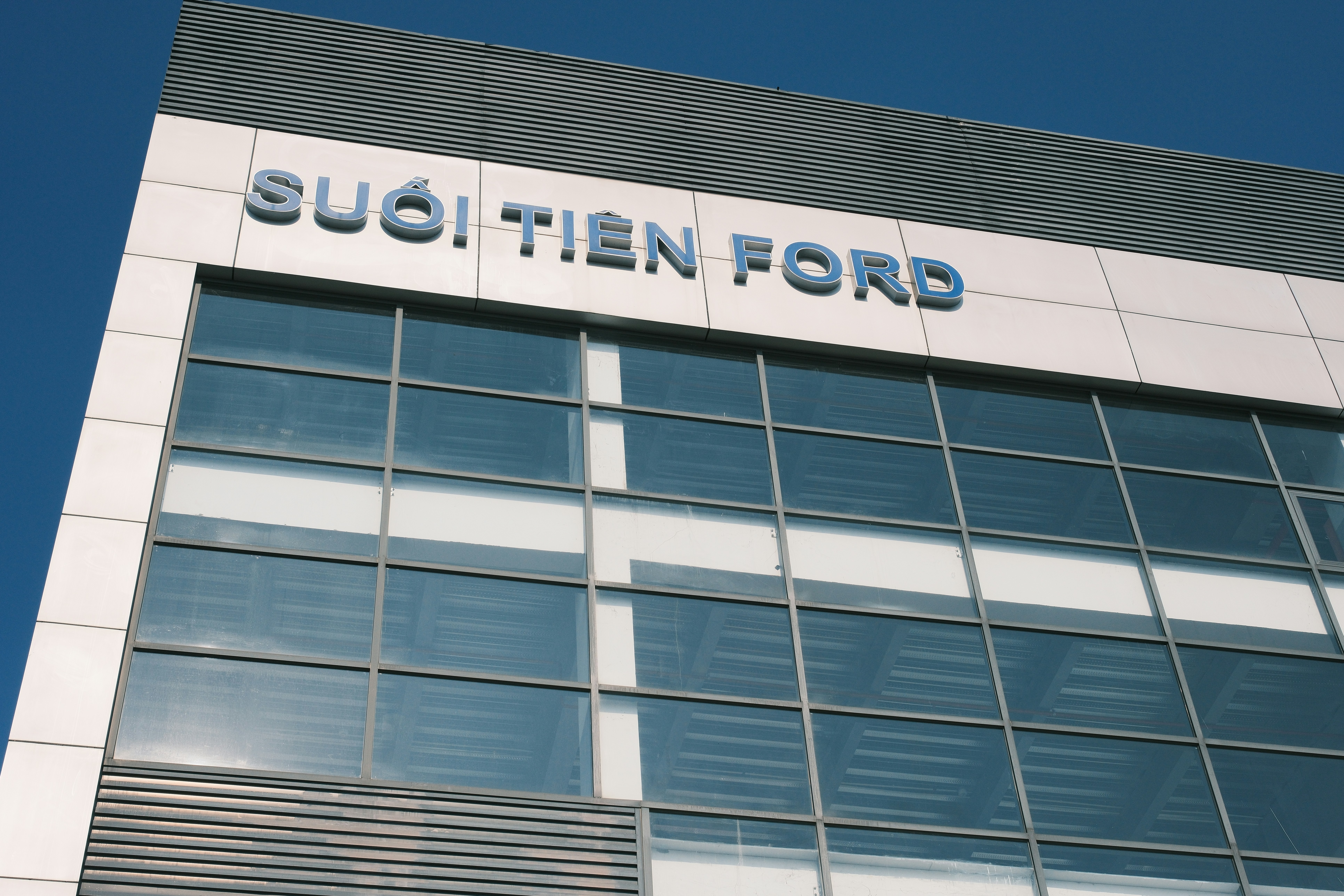 The ford dealership building in vietnam. photo – Free City Image on ...