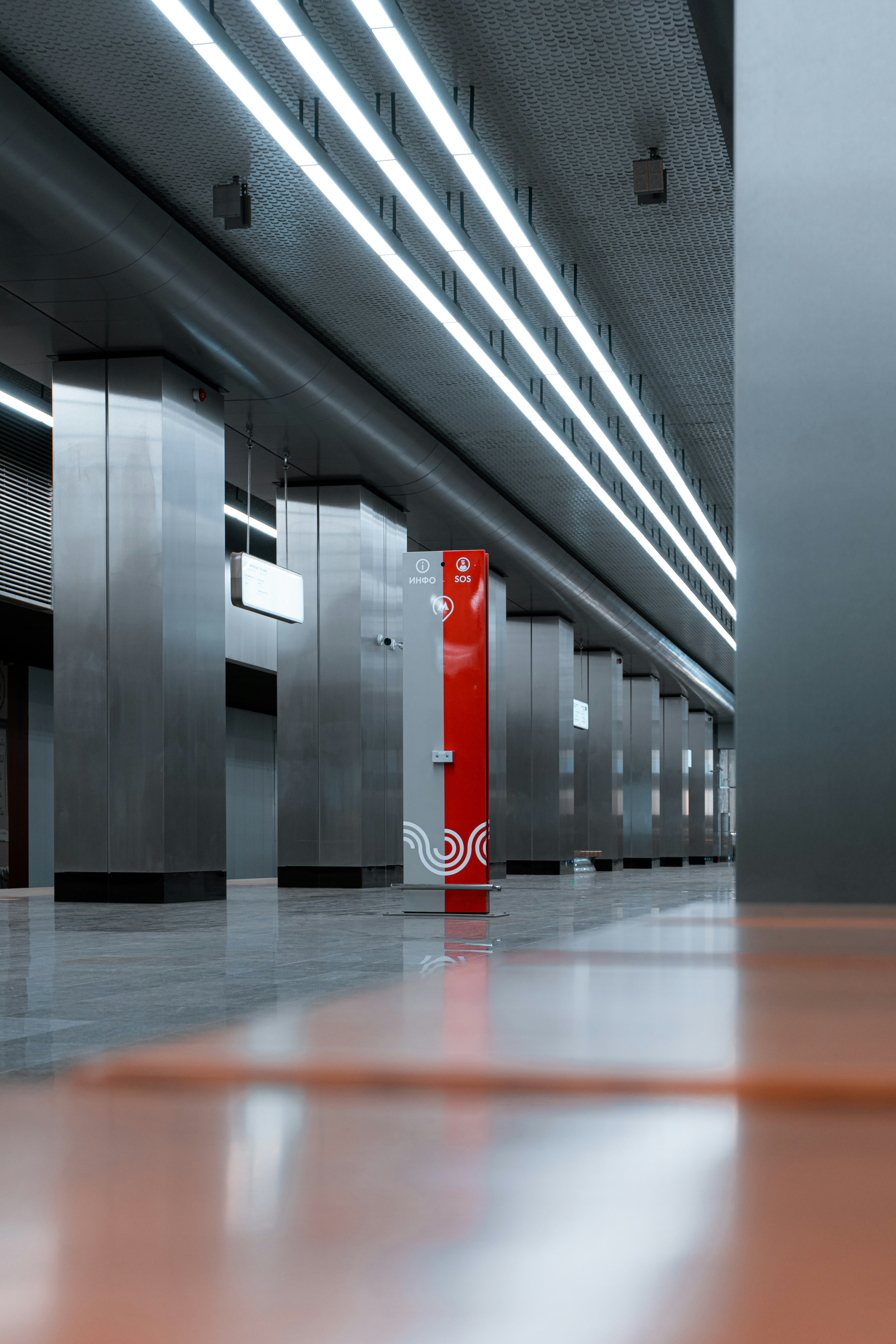 Red Pillar in Chrome Corridor