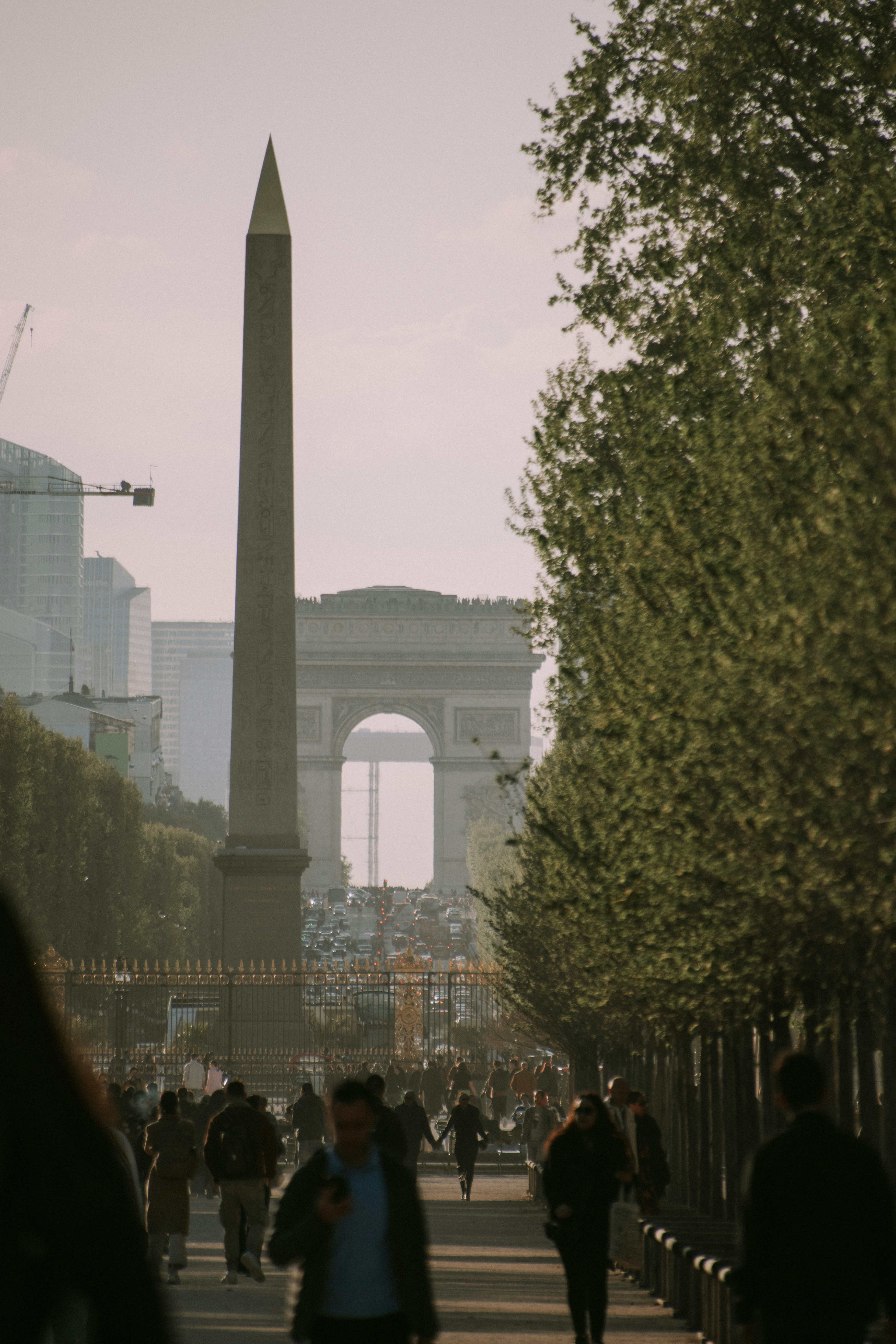 Sunlit Avenue to the Arc: A Parisian Day Beneath the Obelisk