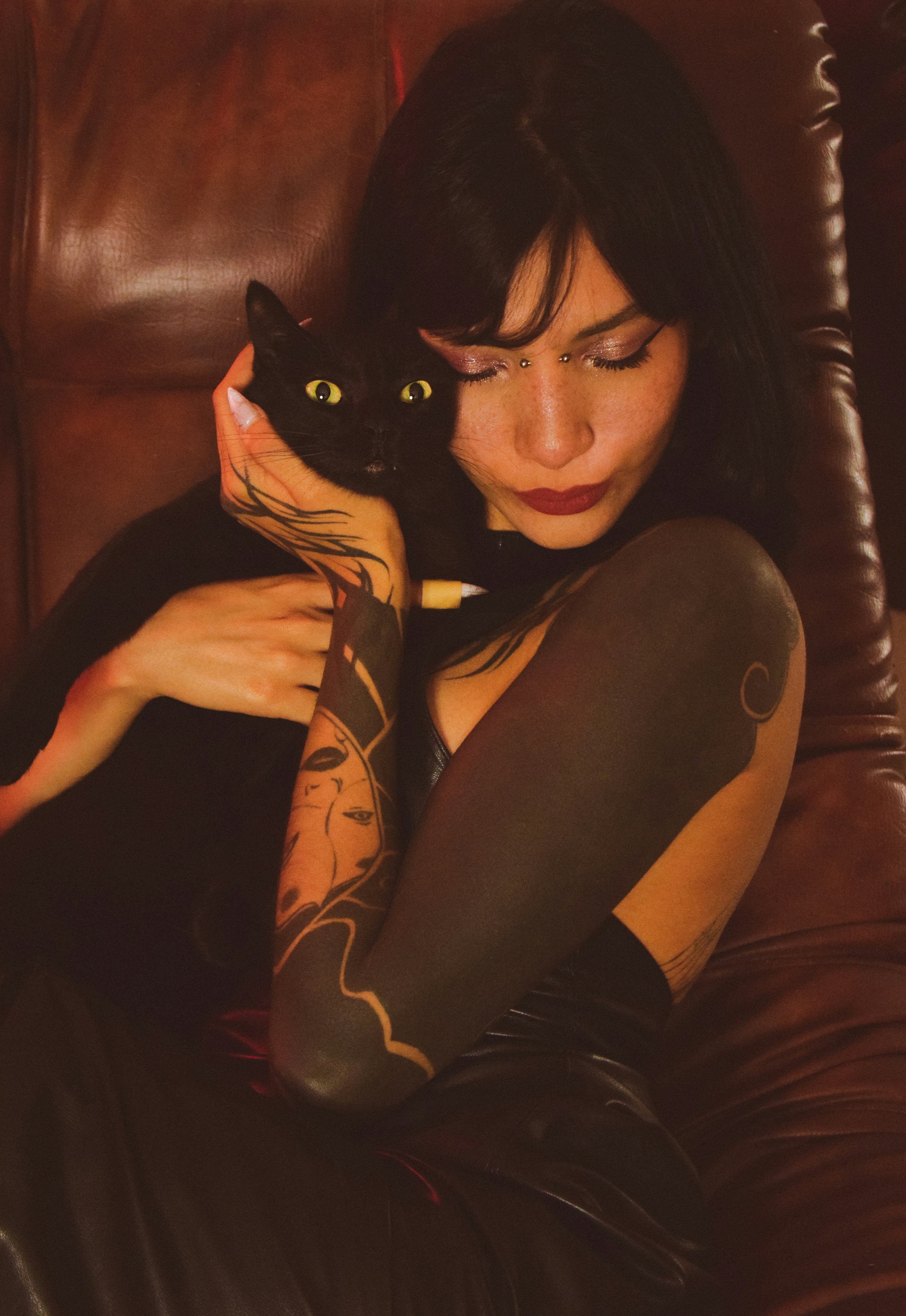 Midnight Halo: A Portrait of Intimate Gaze and Inked Arm
