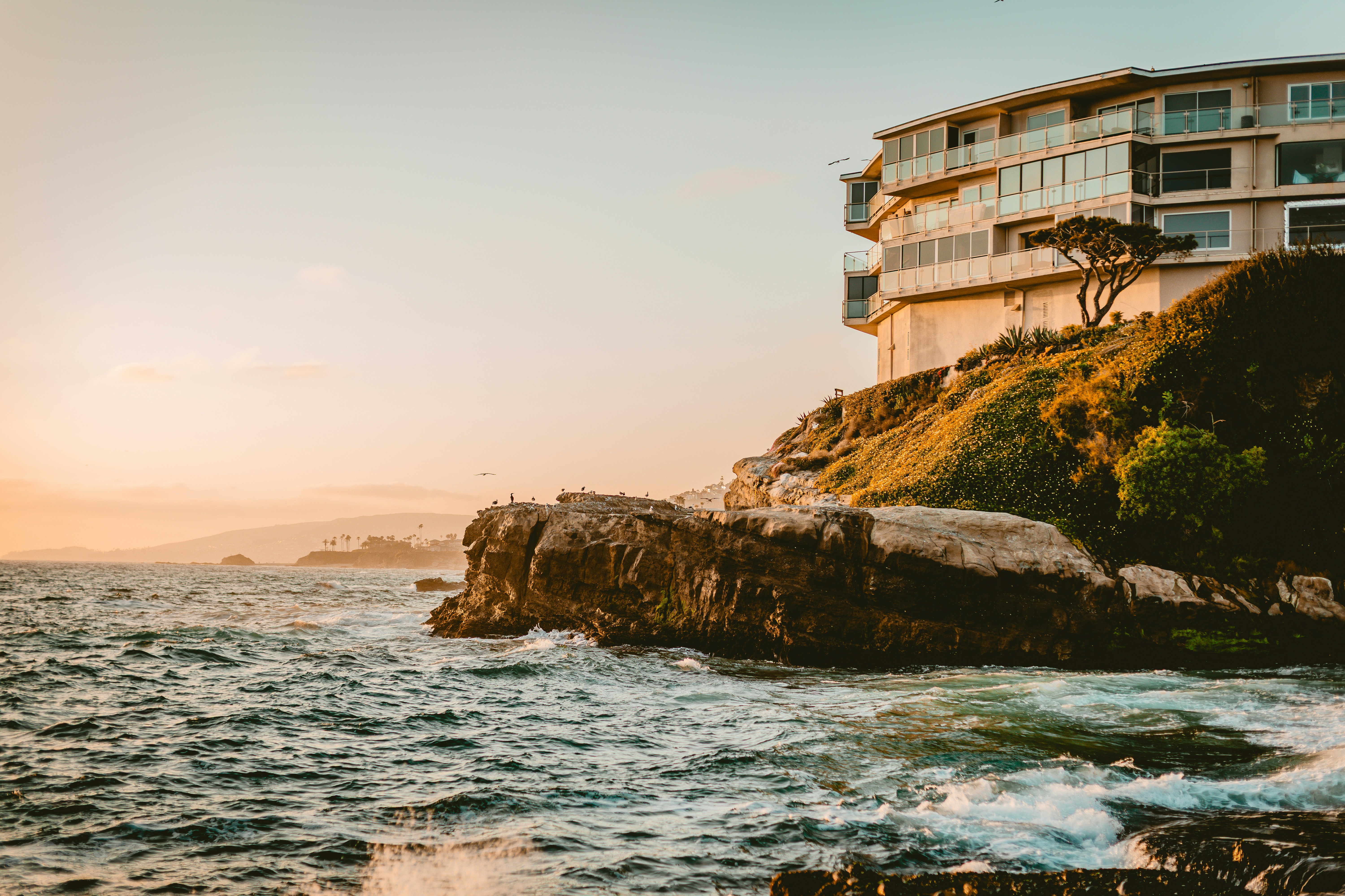 Cliffside Quiet: Sunset Over a Modern Coastal Villa