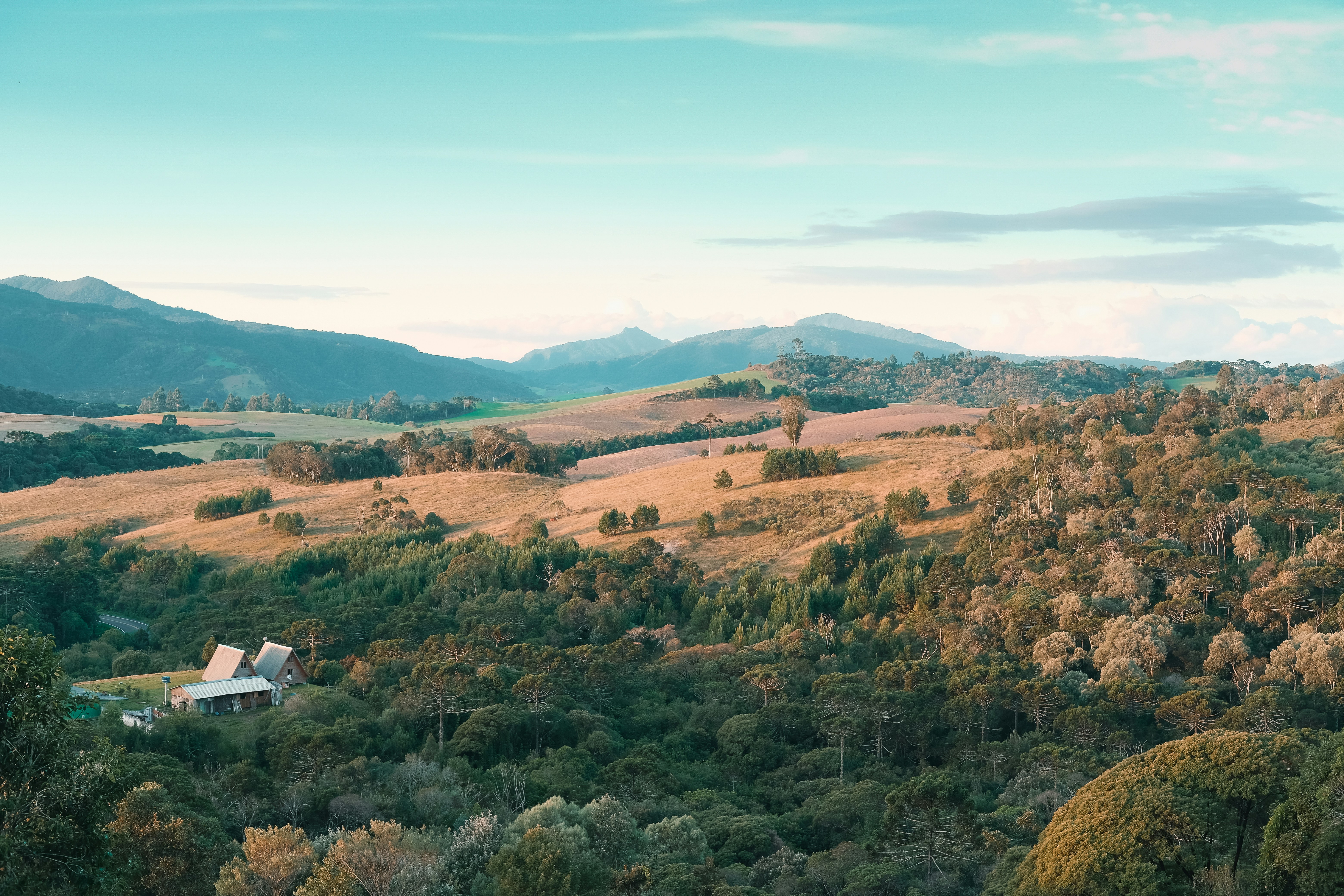 Whispers of the Valley: A Quiet Farmstead Among Rolling Hills