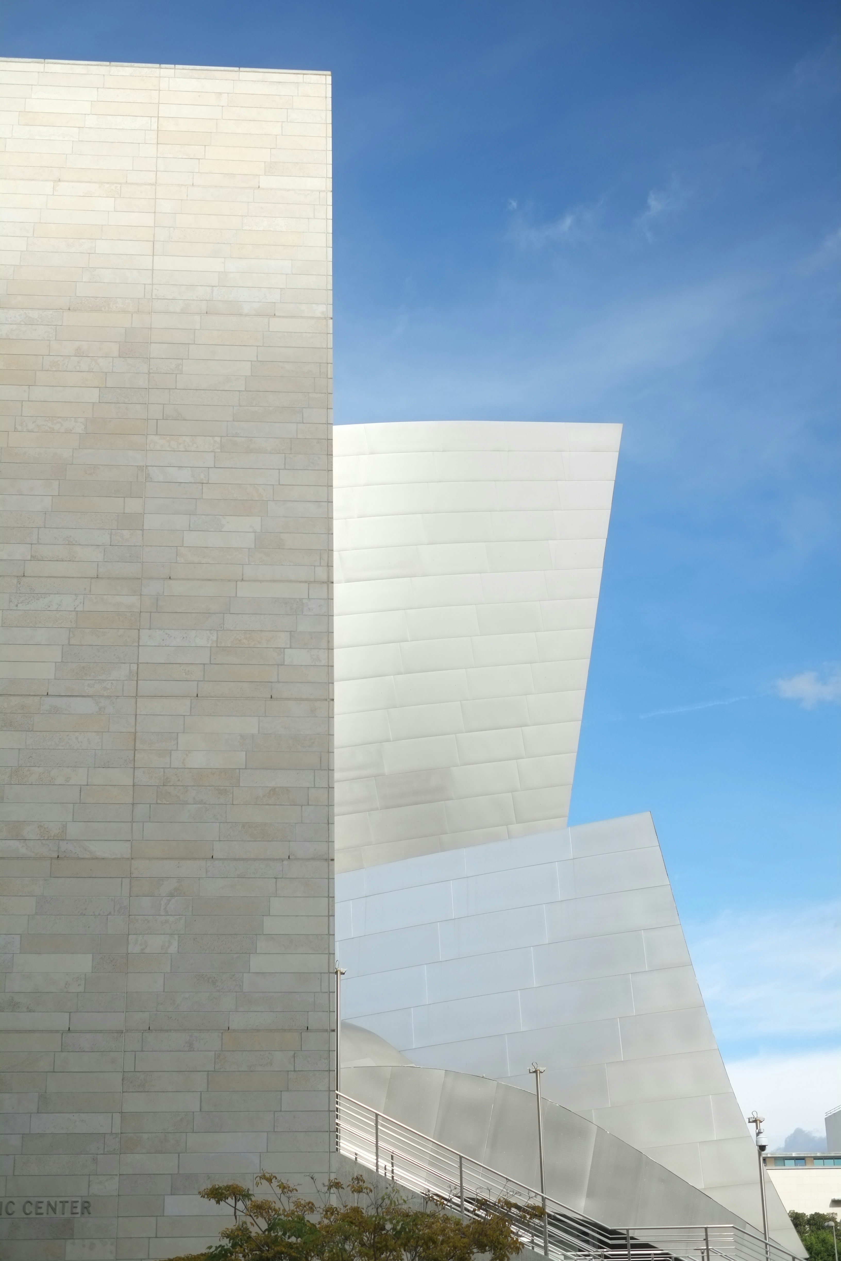 Frank gehry's walt disney concert hall against the blue sky. photo ...