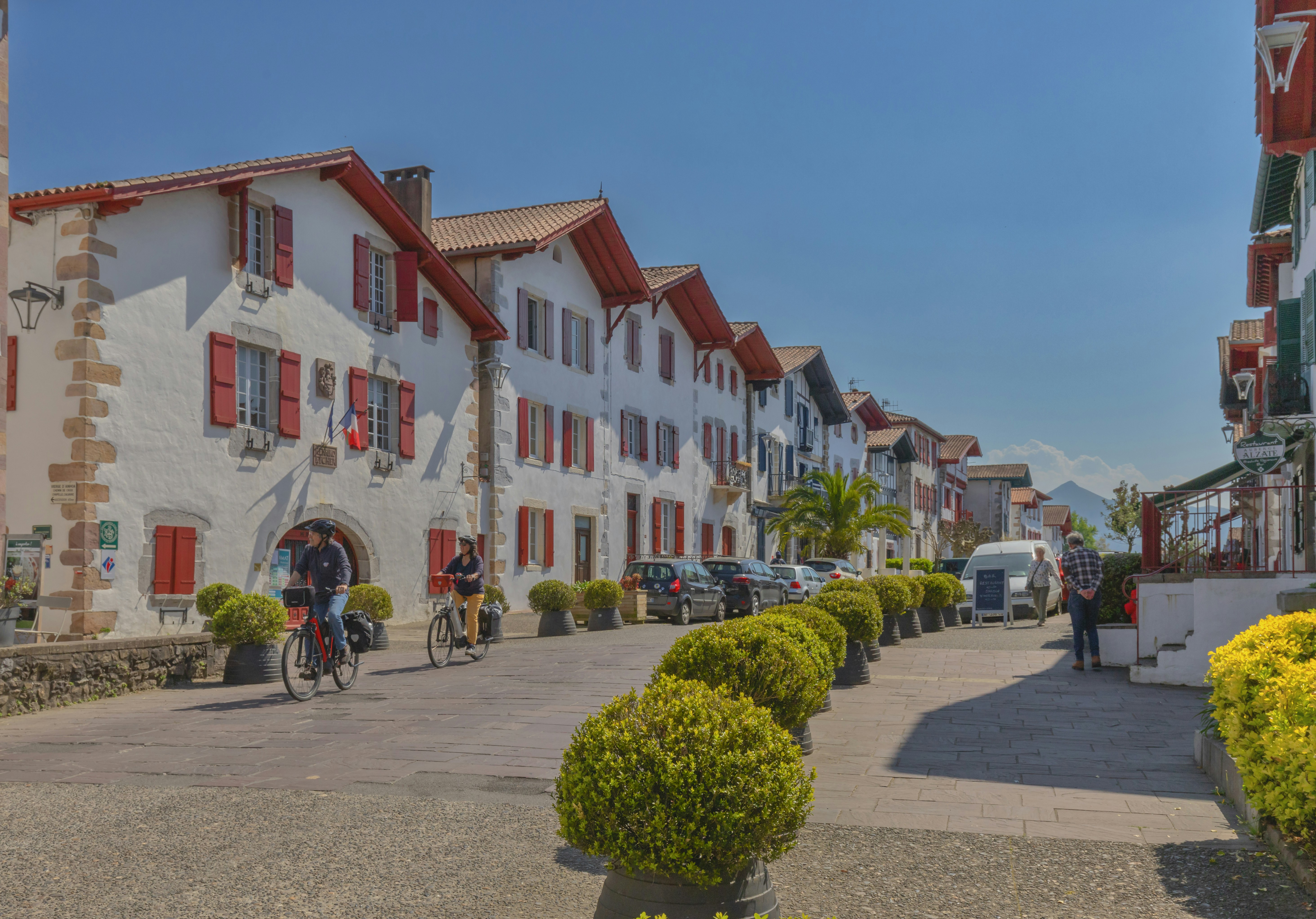 Colorful buildings line a quaint european street. photo – Free France ...