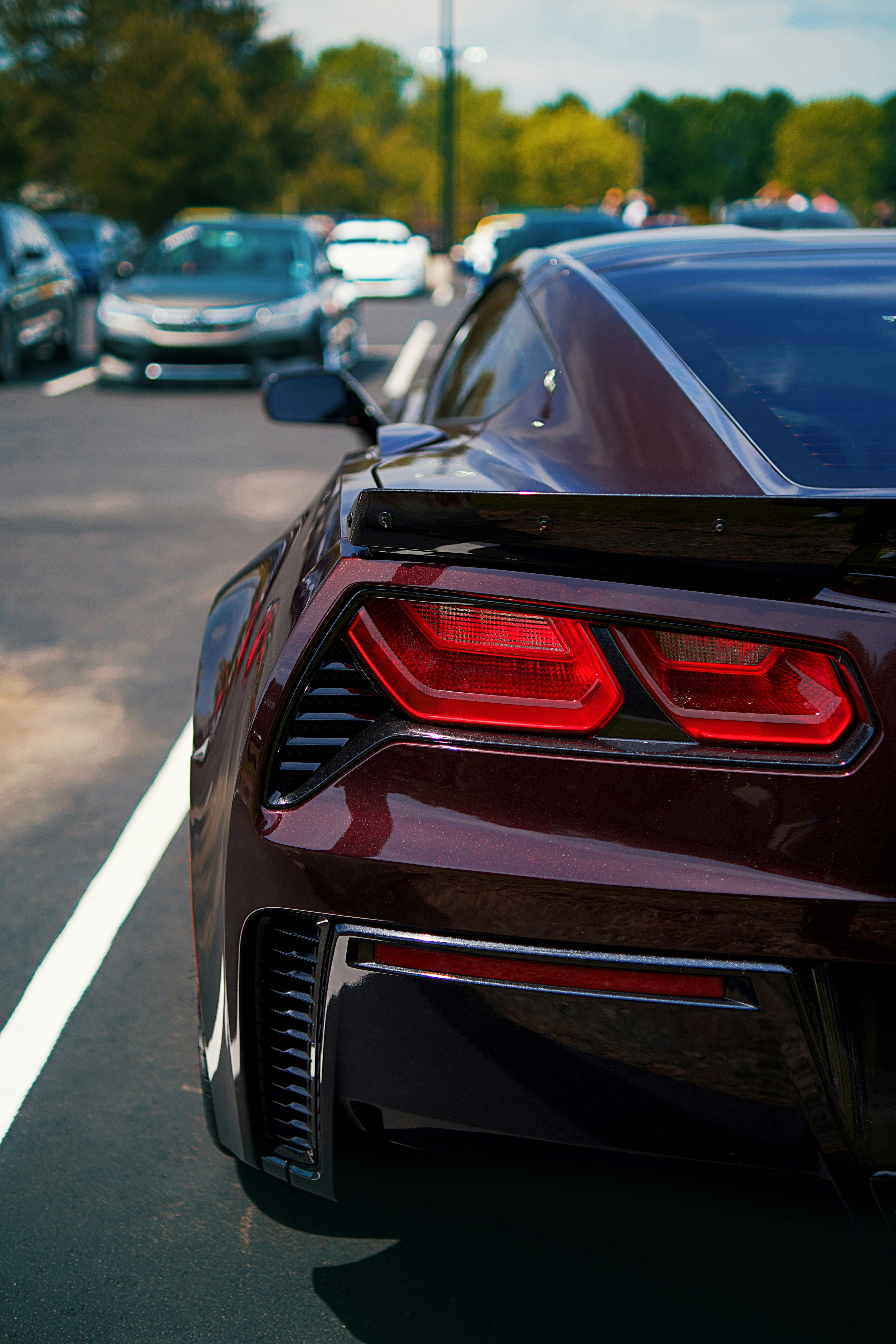 Rear Engine, Red Lines: A Chevy Corvette Parked at Dusk