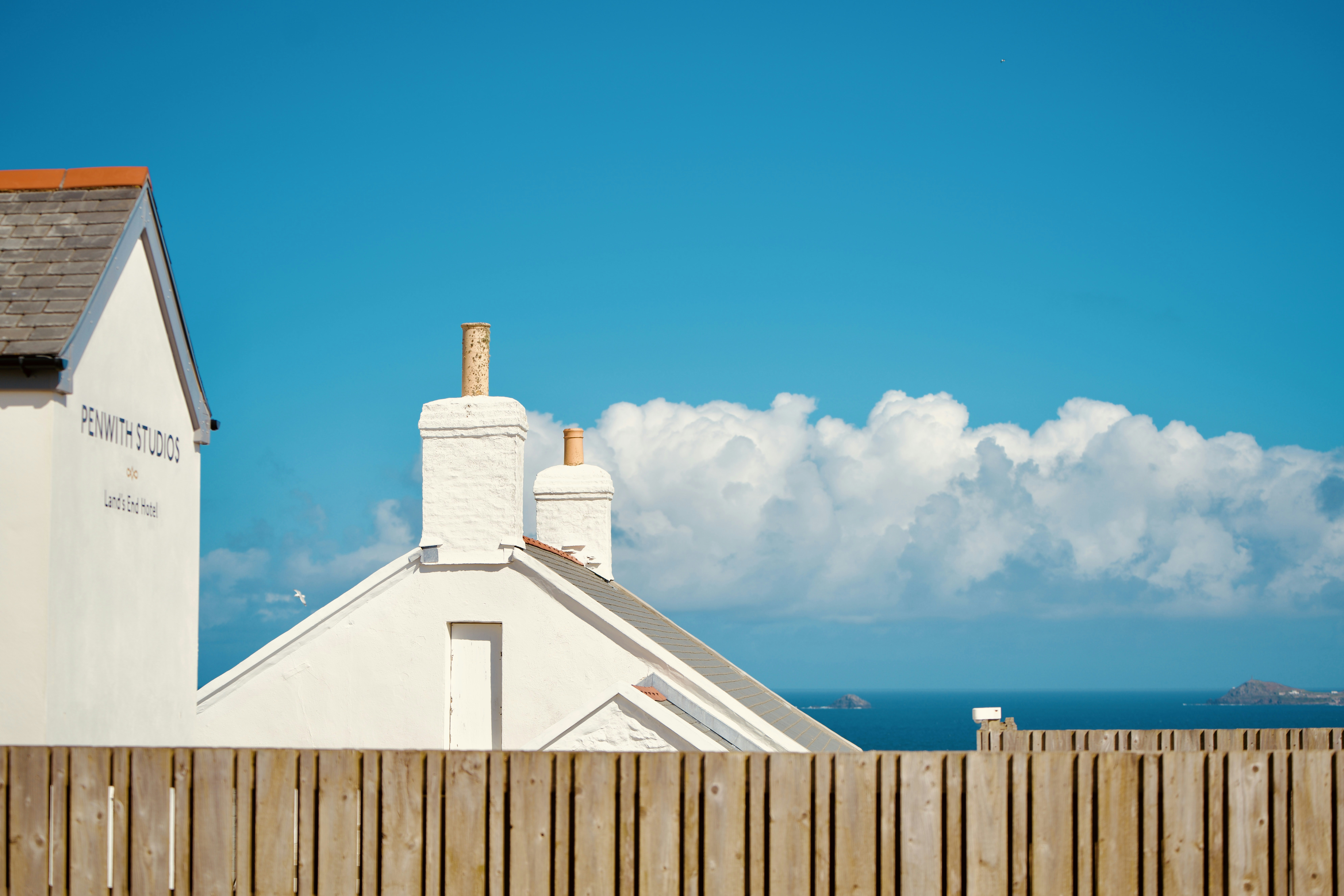 Chimneys and Gables Beneath a Cobalt Sky