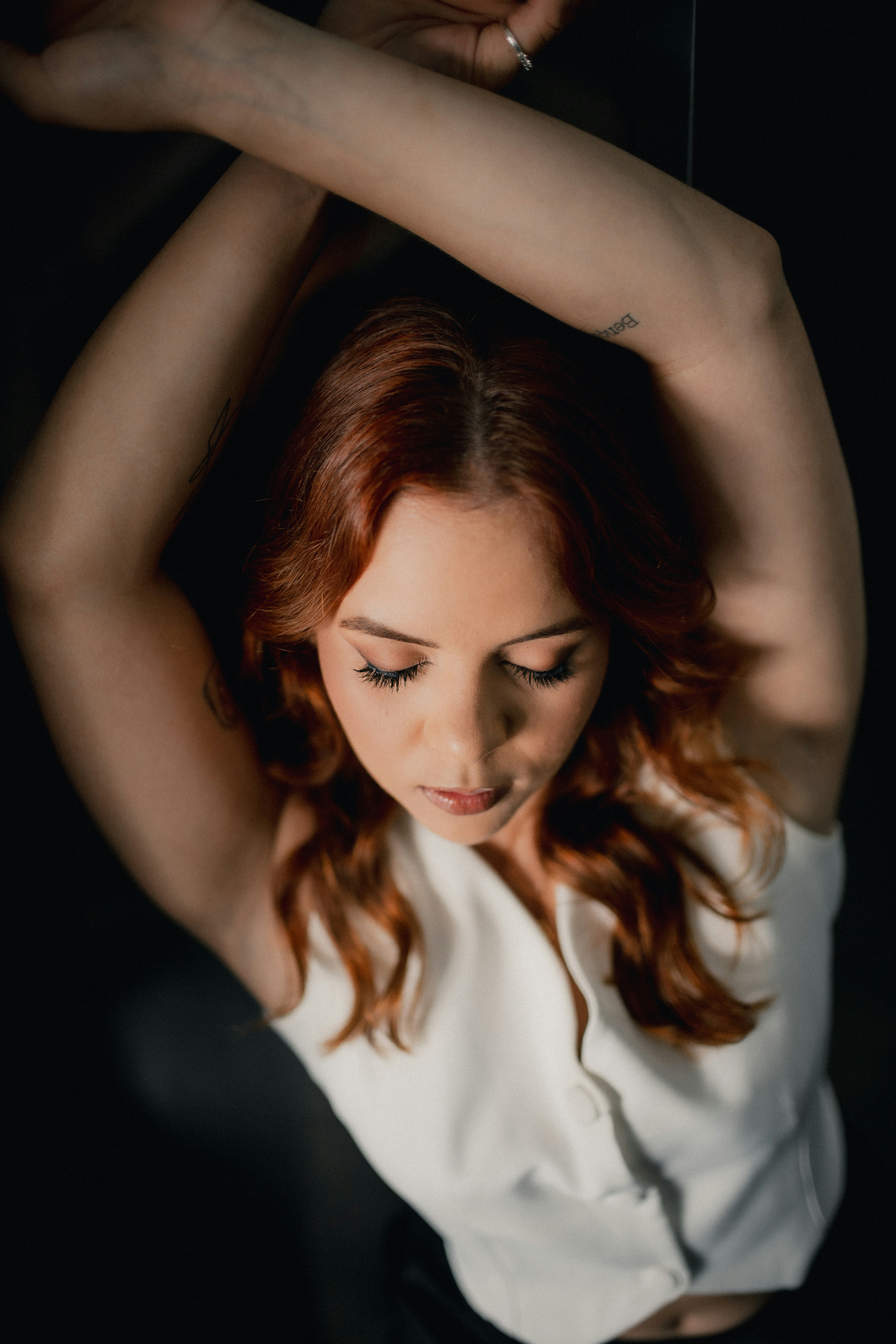 Red-haired woman poses with arms above her head. photo – Free Woman ...