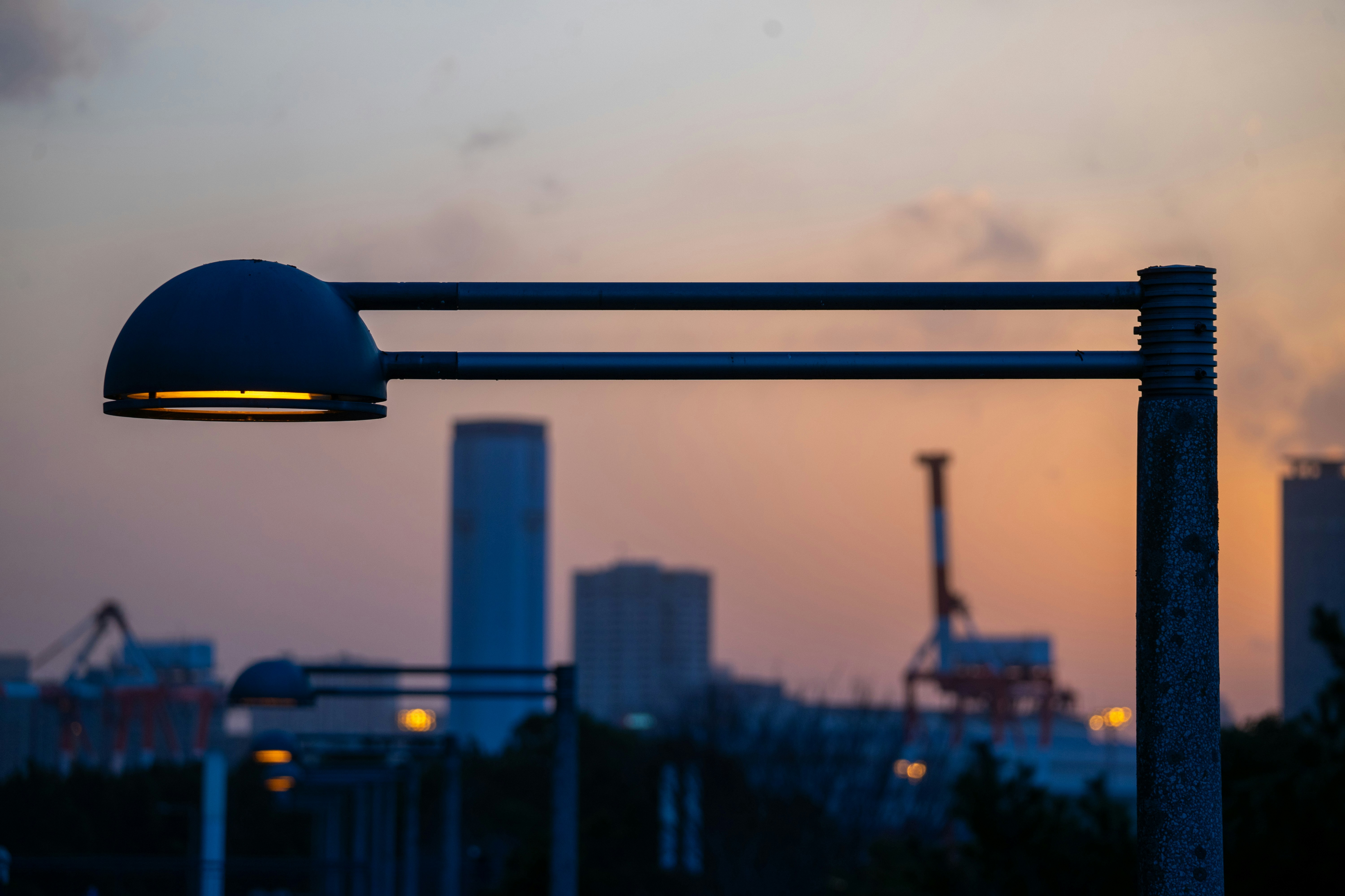 Horizon Lamp: A Quiet Dusk Over the Industrial Skyline