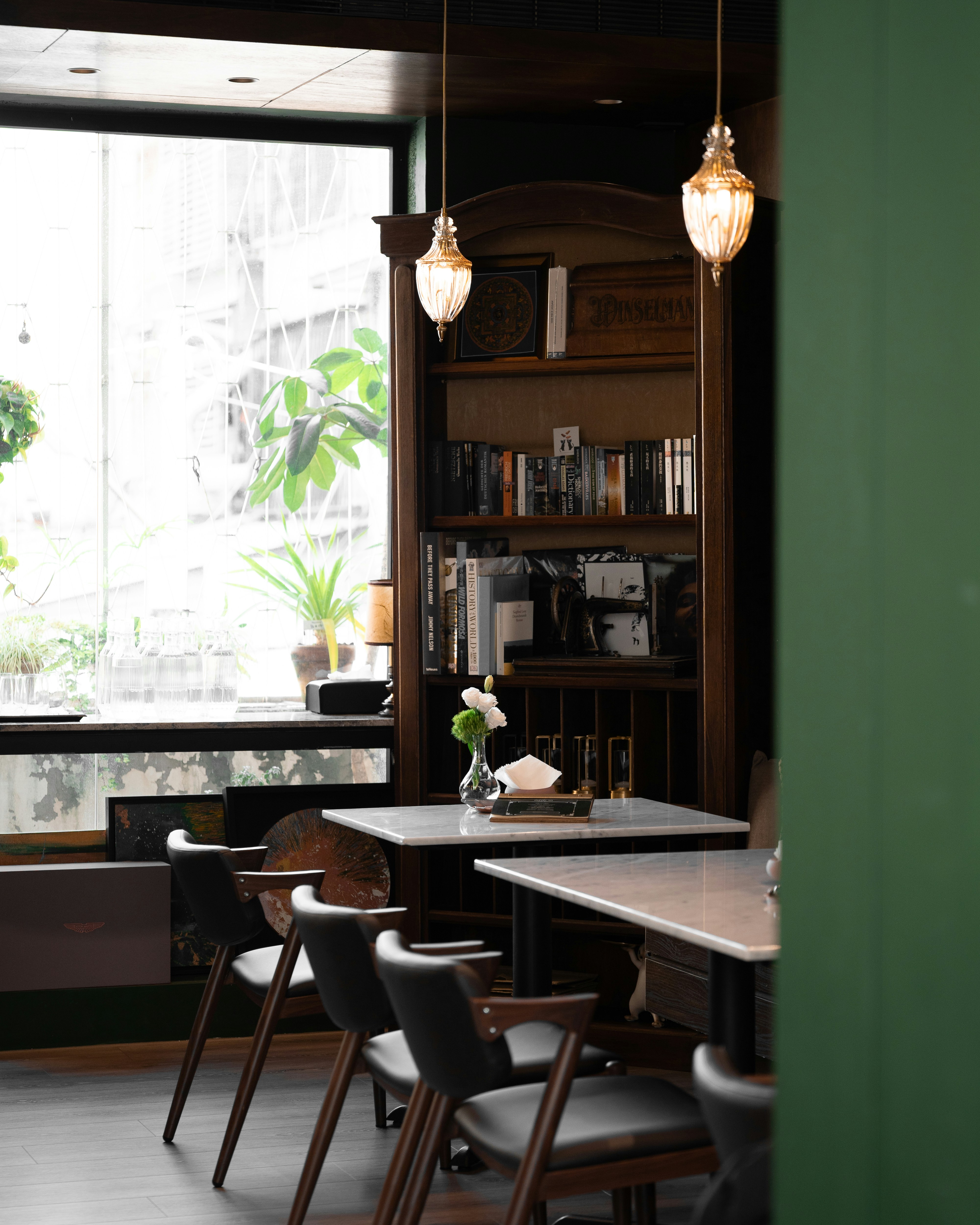 Cozy library-style restaurant interior with elegant lighting. photo ...