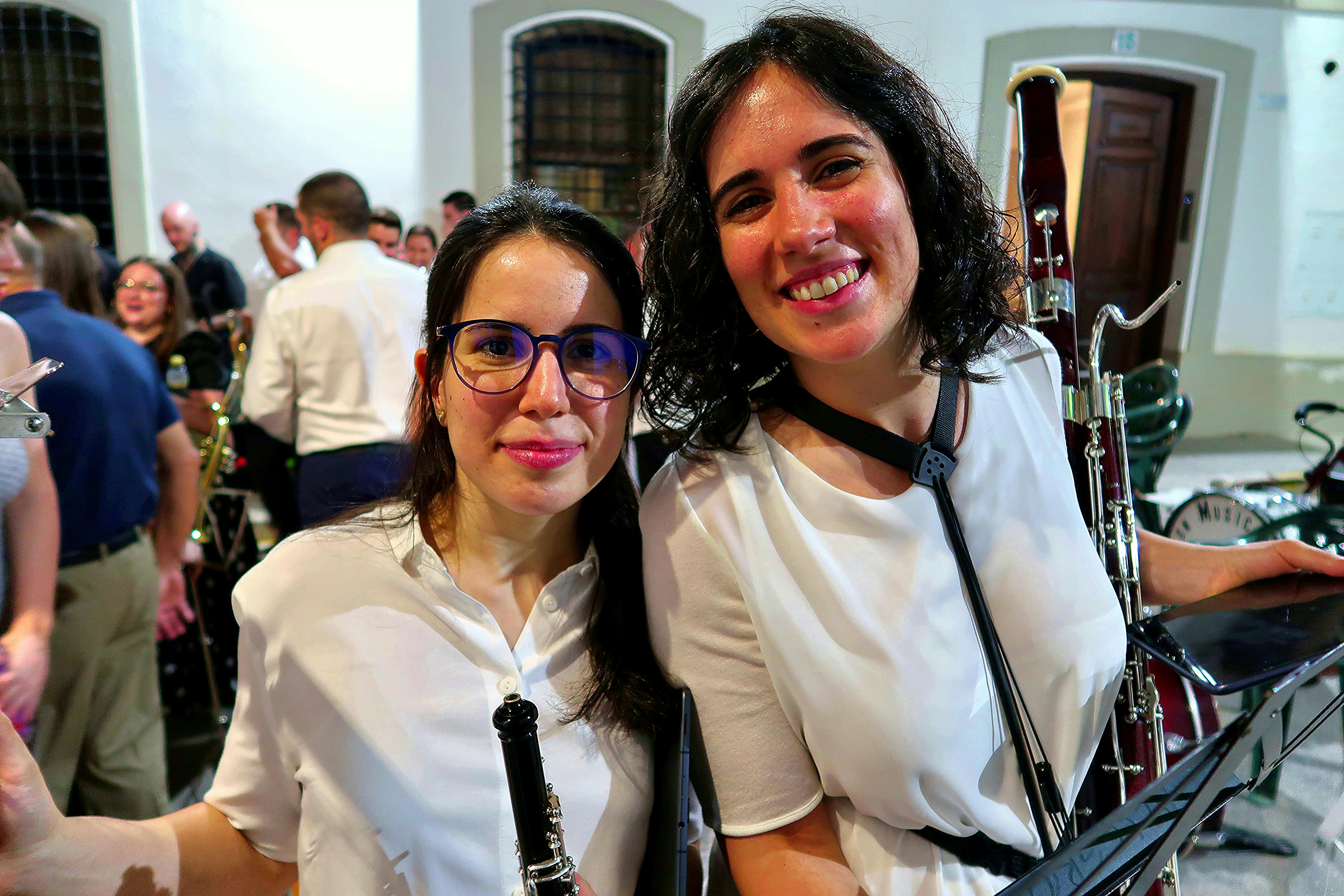 Two smiling musicians pose for a photo. photo – Free Image on Unsplash