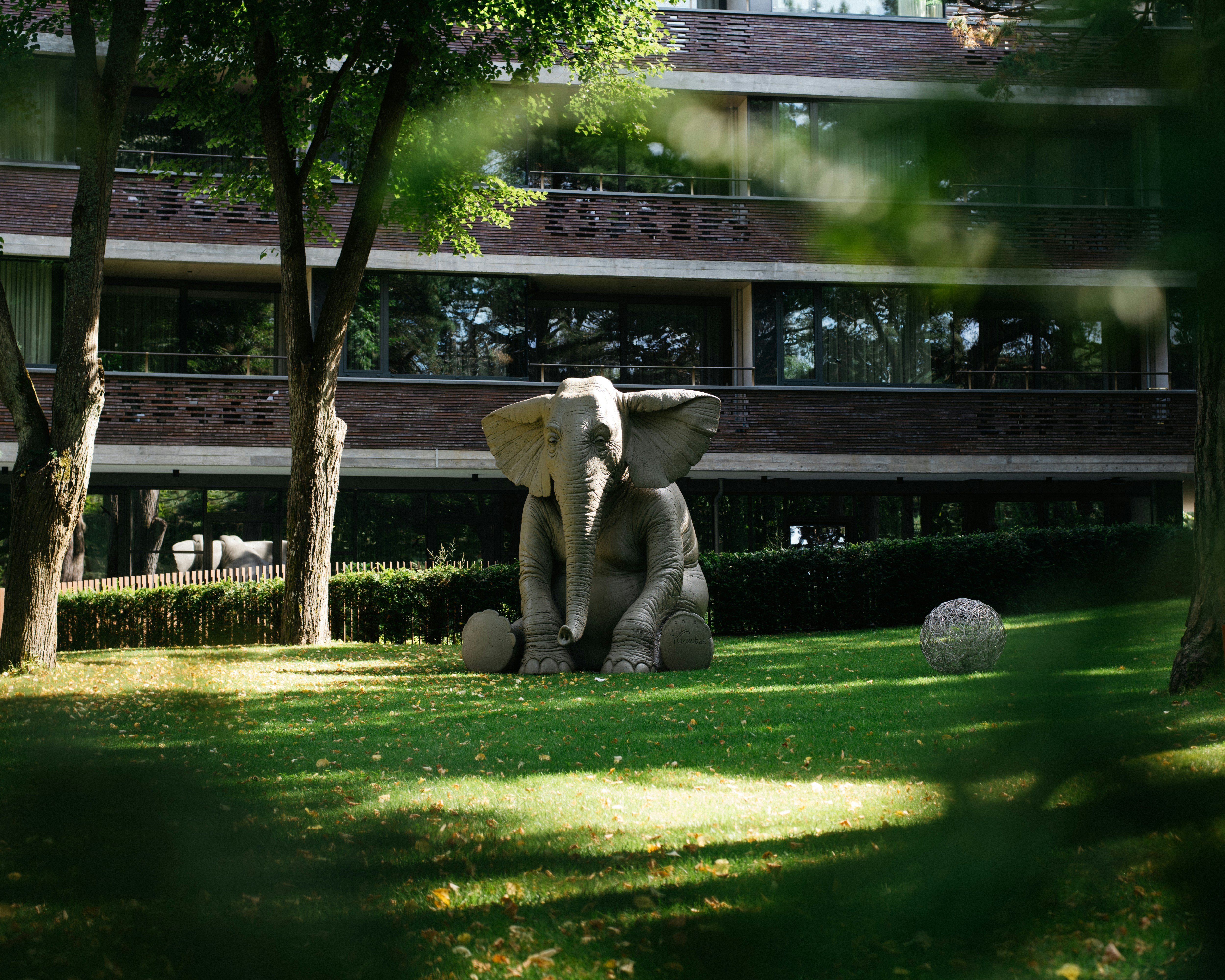 Stone Elephant in Sunlit Courtyard