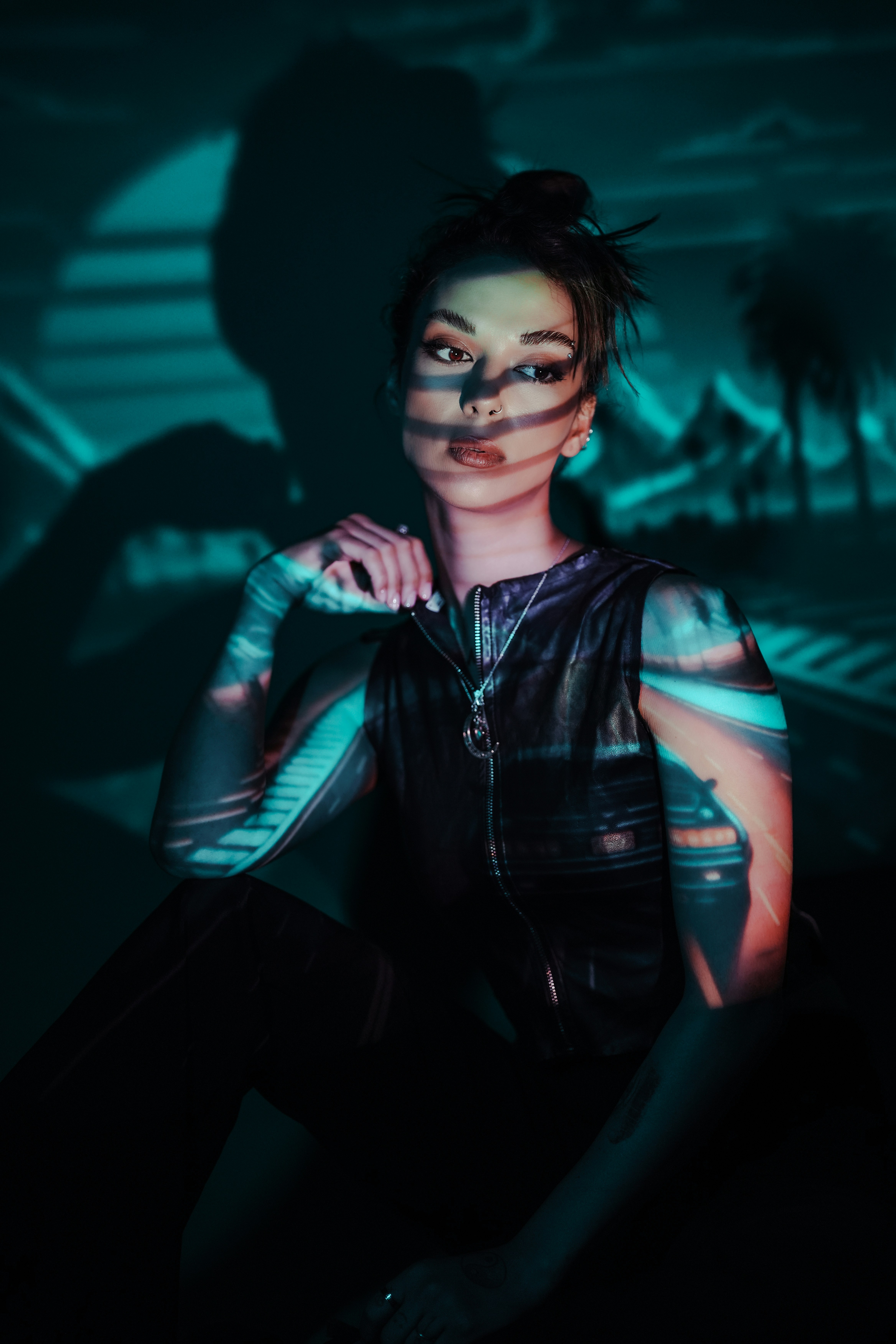 Teal Projection Portrait: Striped Light Tracing a Velvet Look