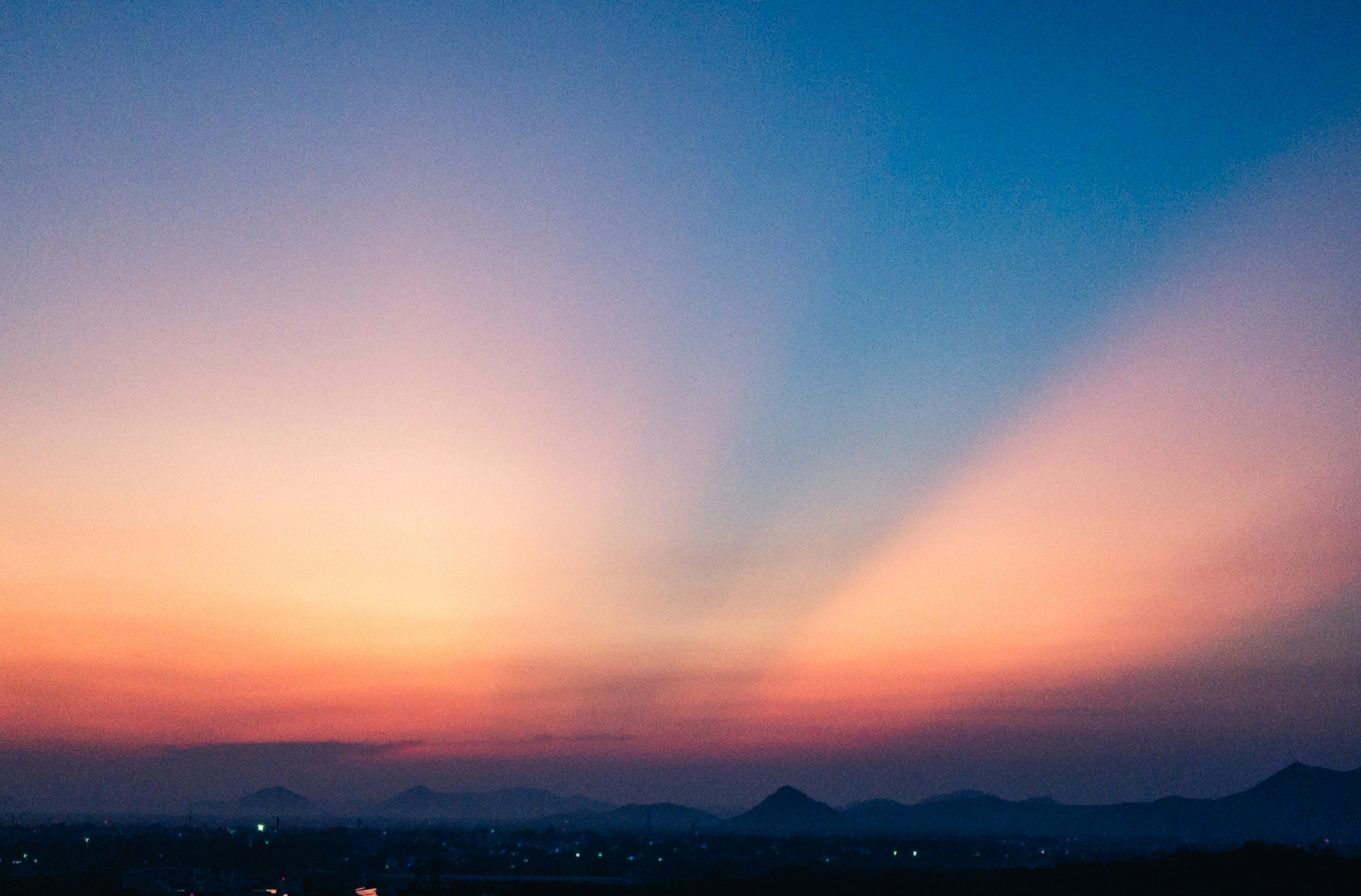 Dawn's Gradient Over a Quiet Metropolitan Horizon