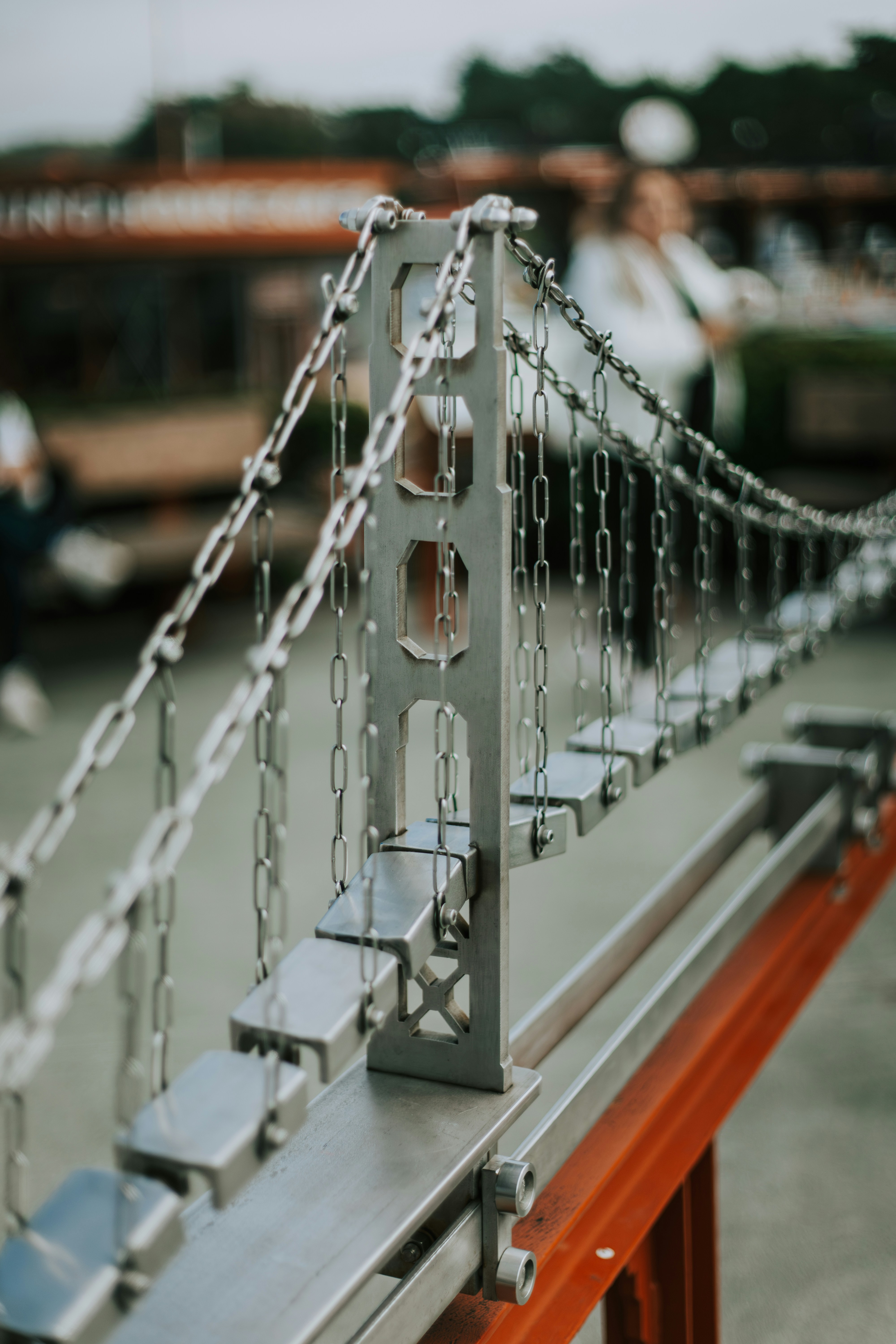 A miniature sculpture of a metal suspension bridge. photo – Free Usa ...