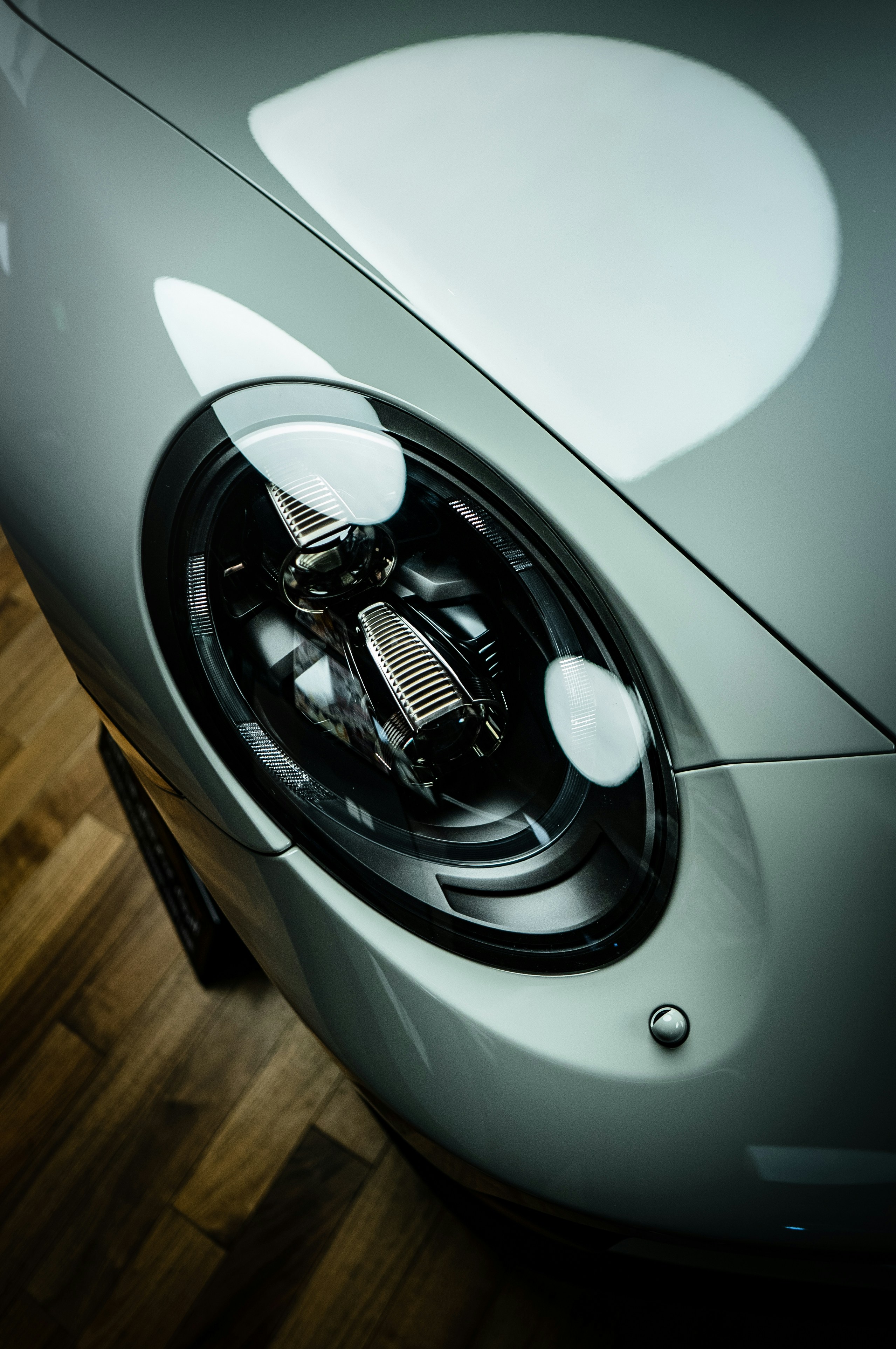 Silent Silver Angles: A Close-Up of Refined Headlight Geometry