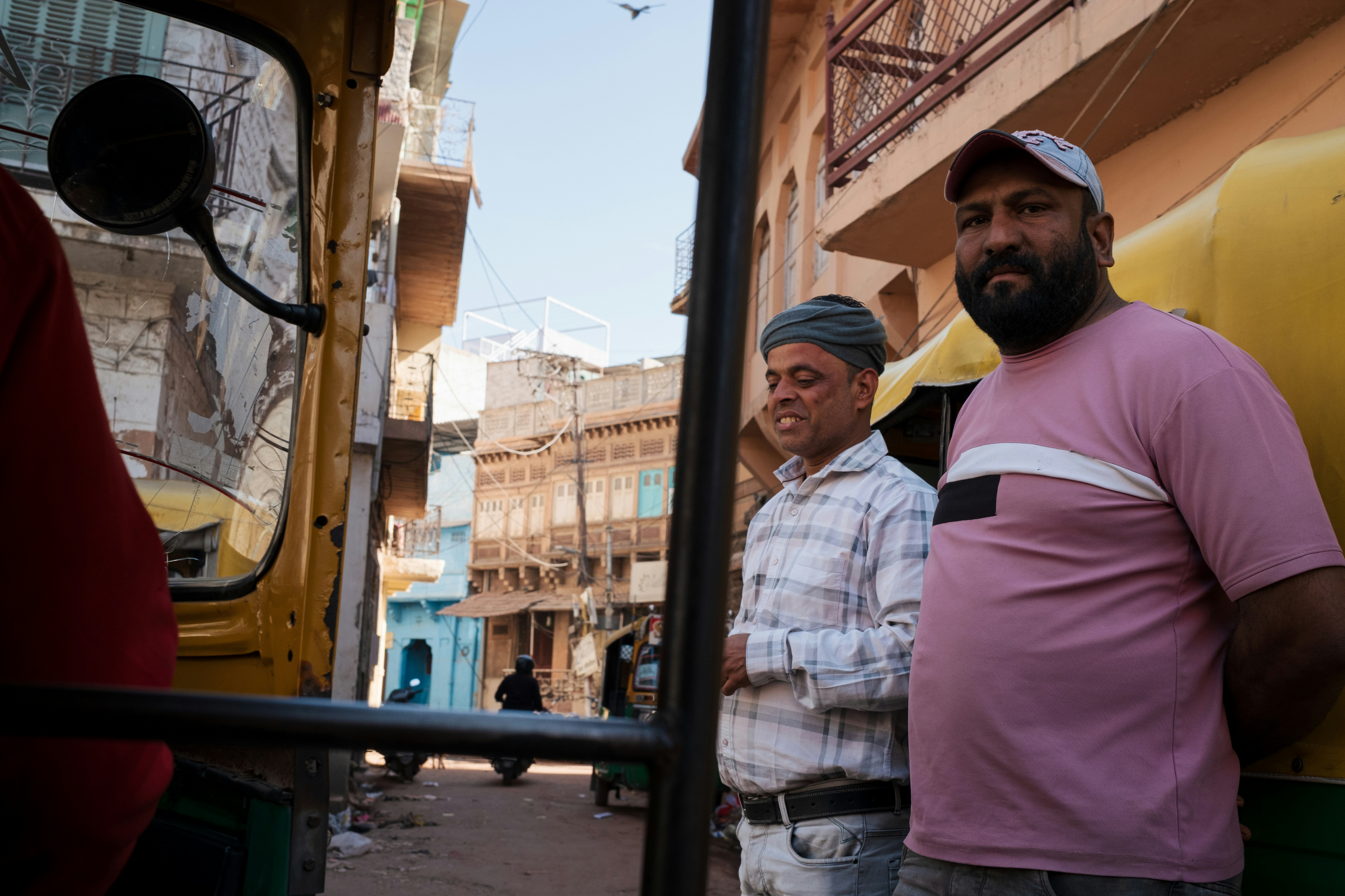 Quiet Street Portrait by a Sunlit Tuk-Tuk