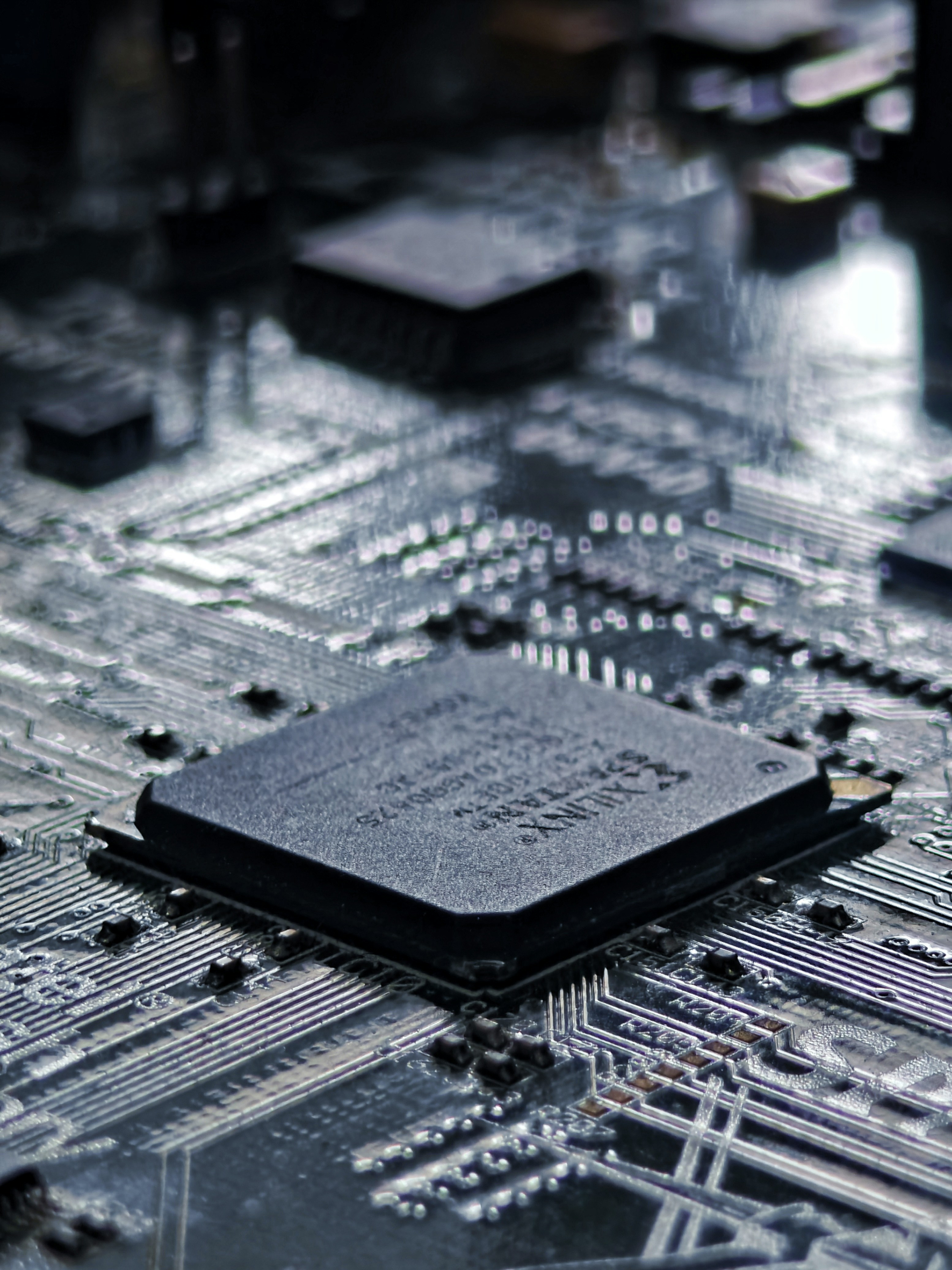 A detailed close-up of a computer motherboard. photo – Free ...