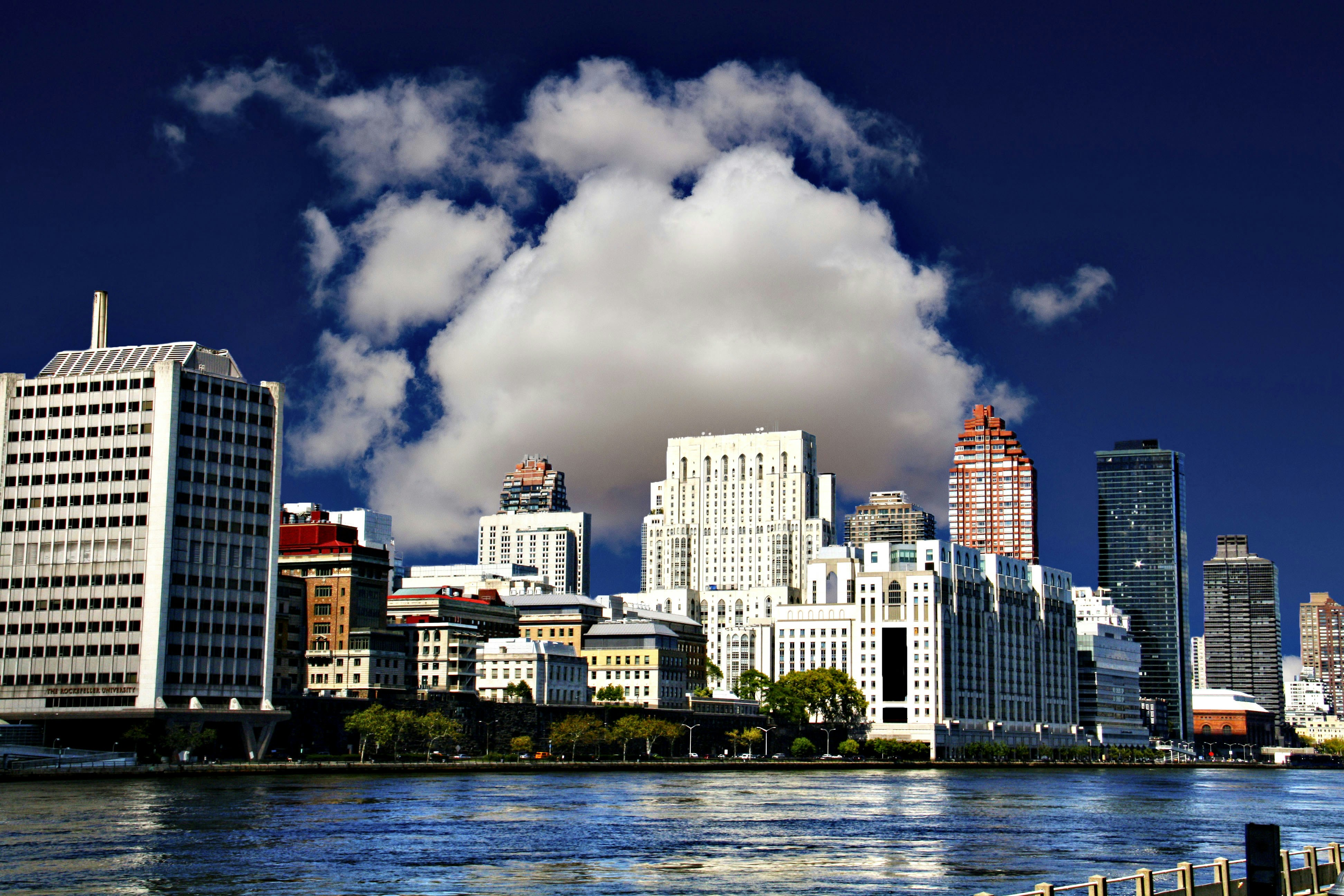 Skyline at Dusk: The Citys Edge Reflects on the River