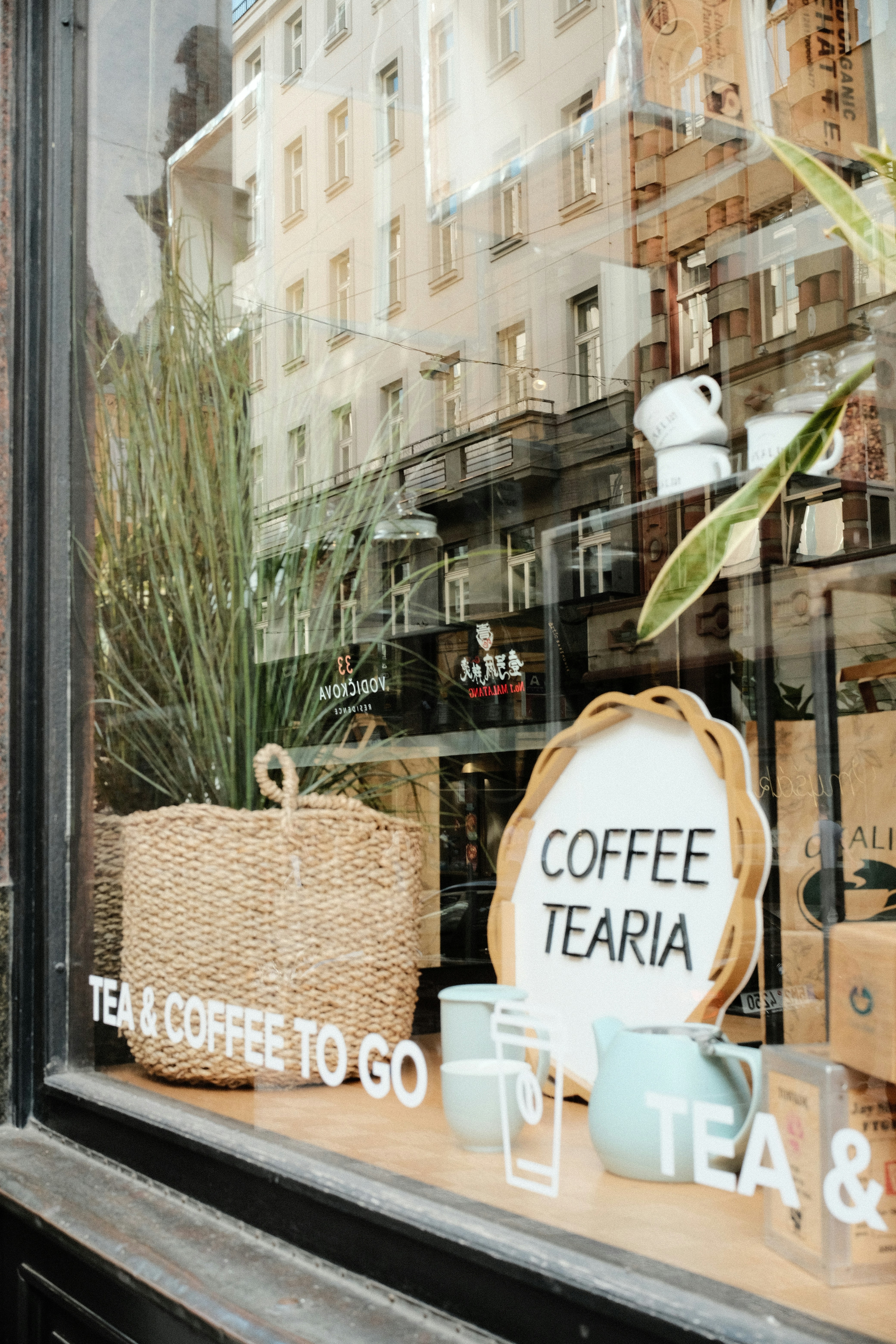 Coffee and tea shop displayed in a window. photo – Free Coffee Image on ...