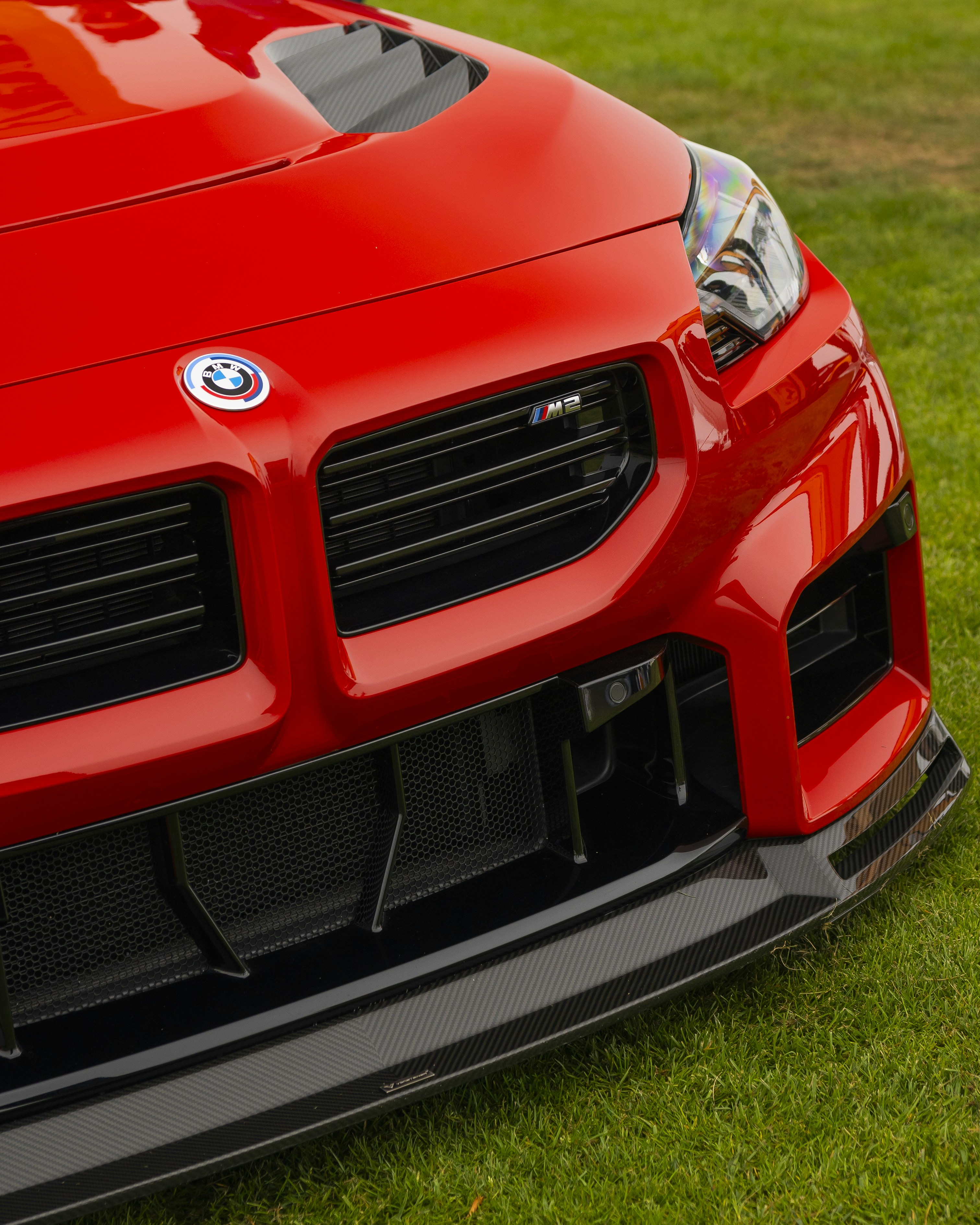 Red BMW m2 front view. photo – Free Usa Image on Unsplash