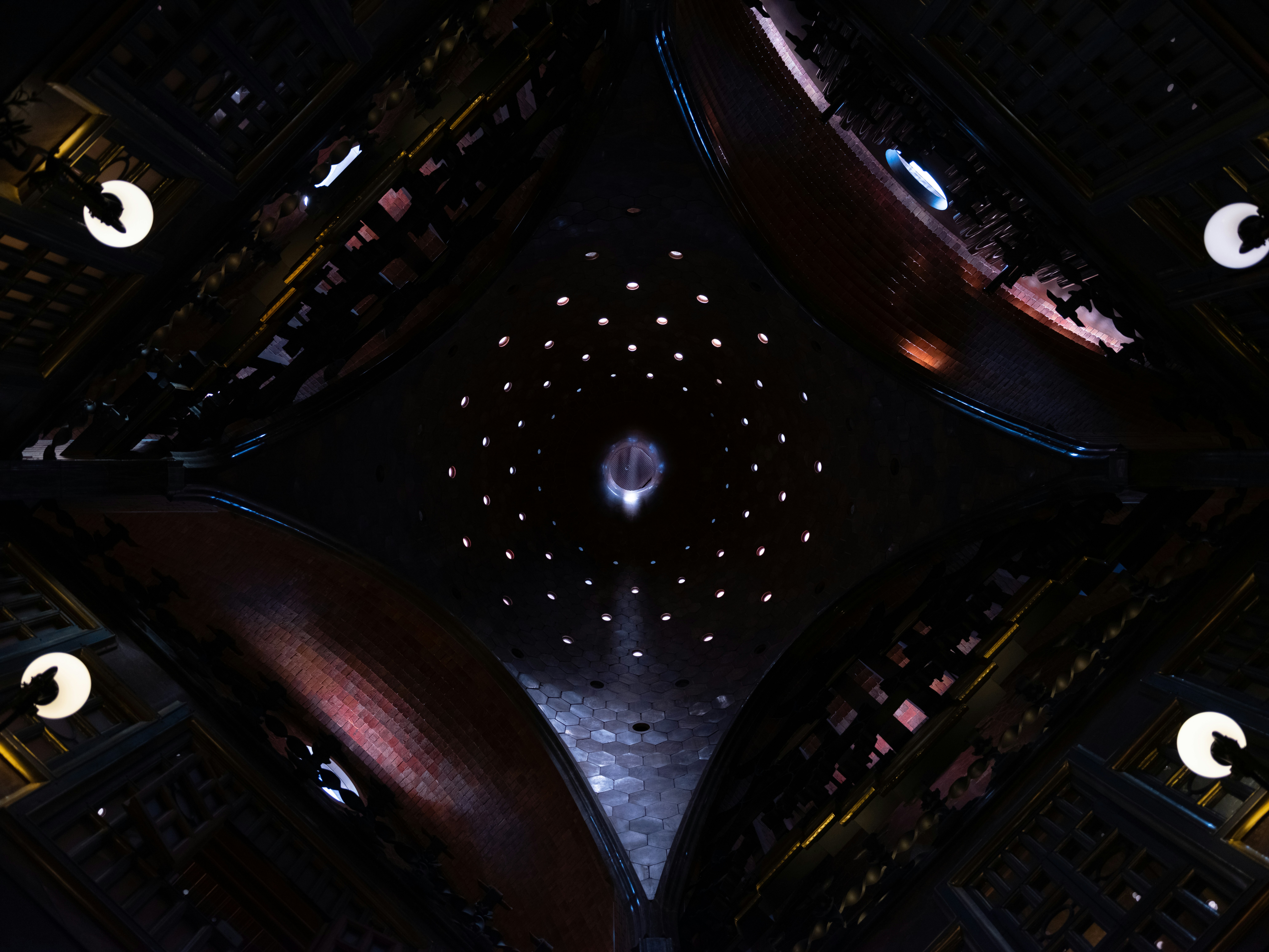 Orbital Light at the Heart of a Vaulted Atrium