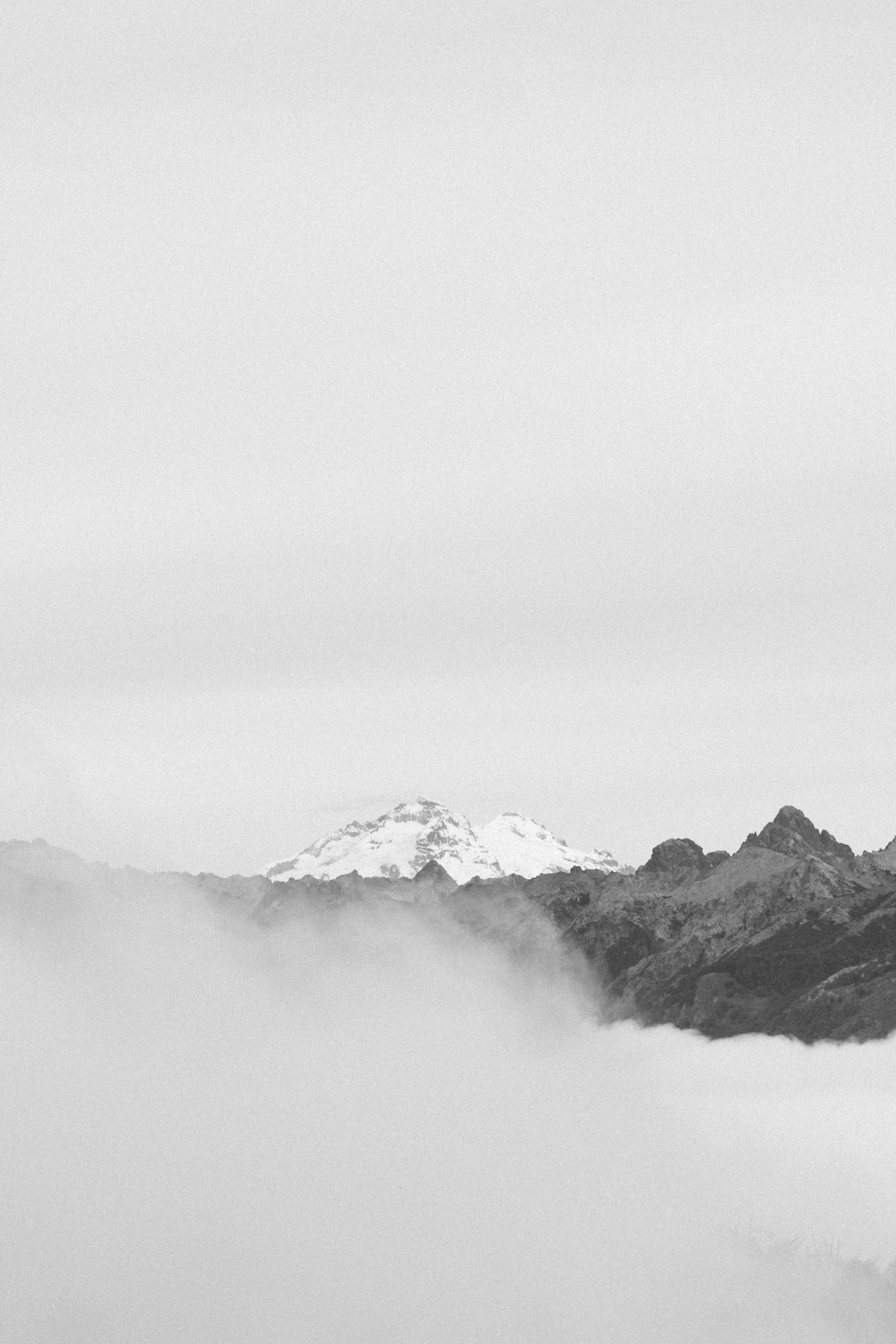 Mountains rise above a sea of clouds. photo – Free Argentina Image on ...