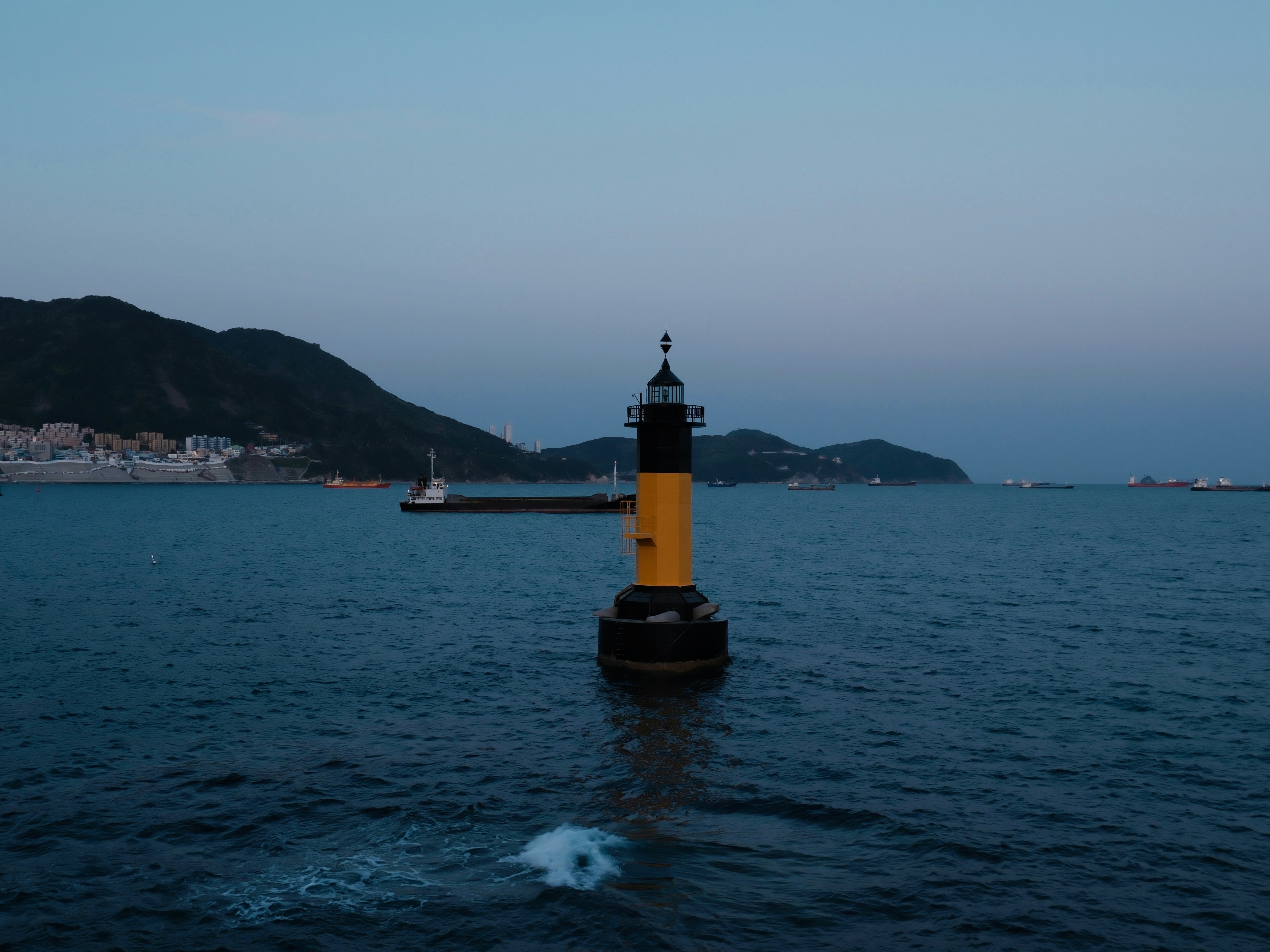 Dusk Beacon on a Quiet Harbor Buoy