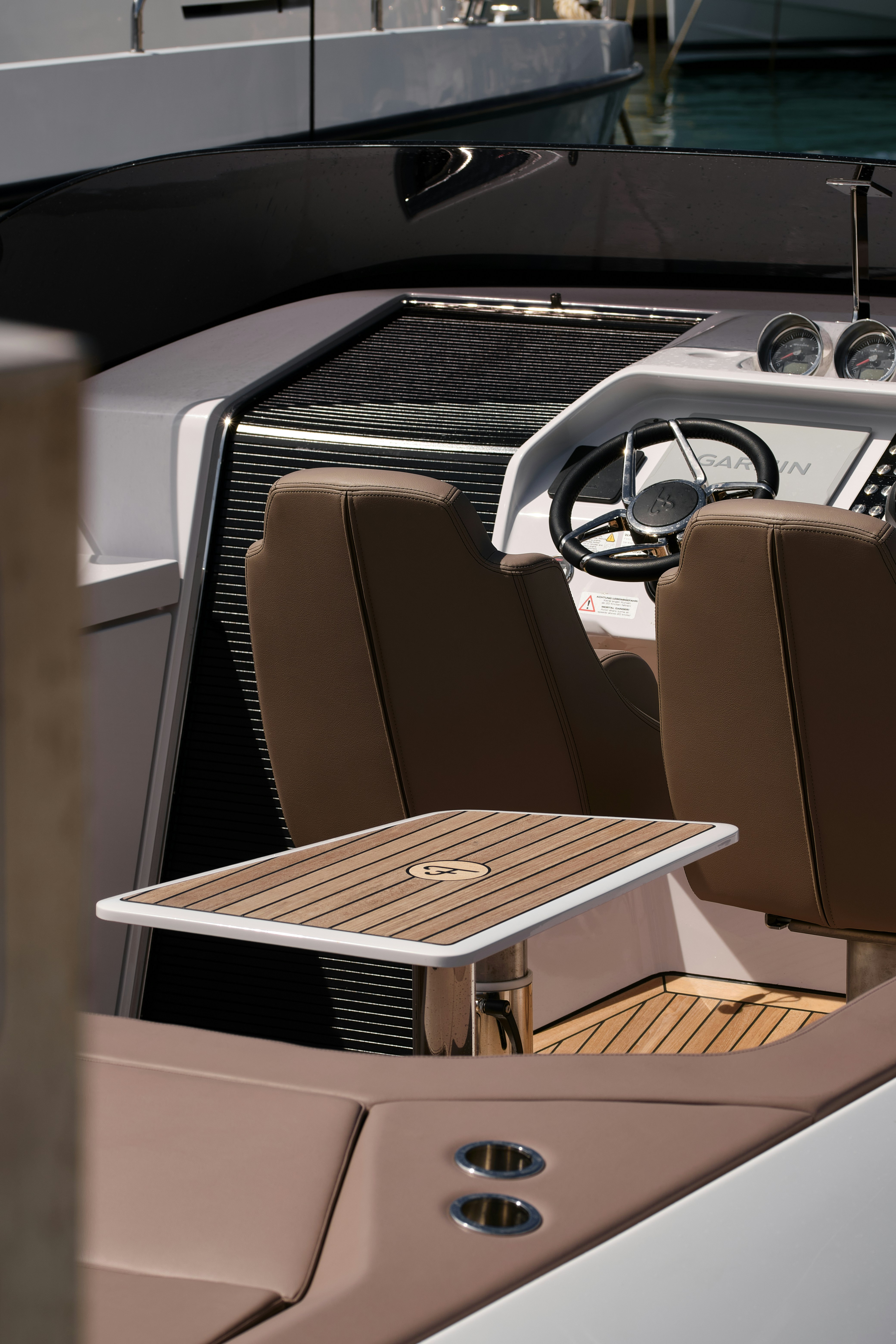 Teak and Chrome at the Helm: A Sunlit Yacht Cockpit