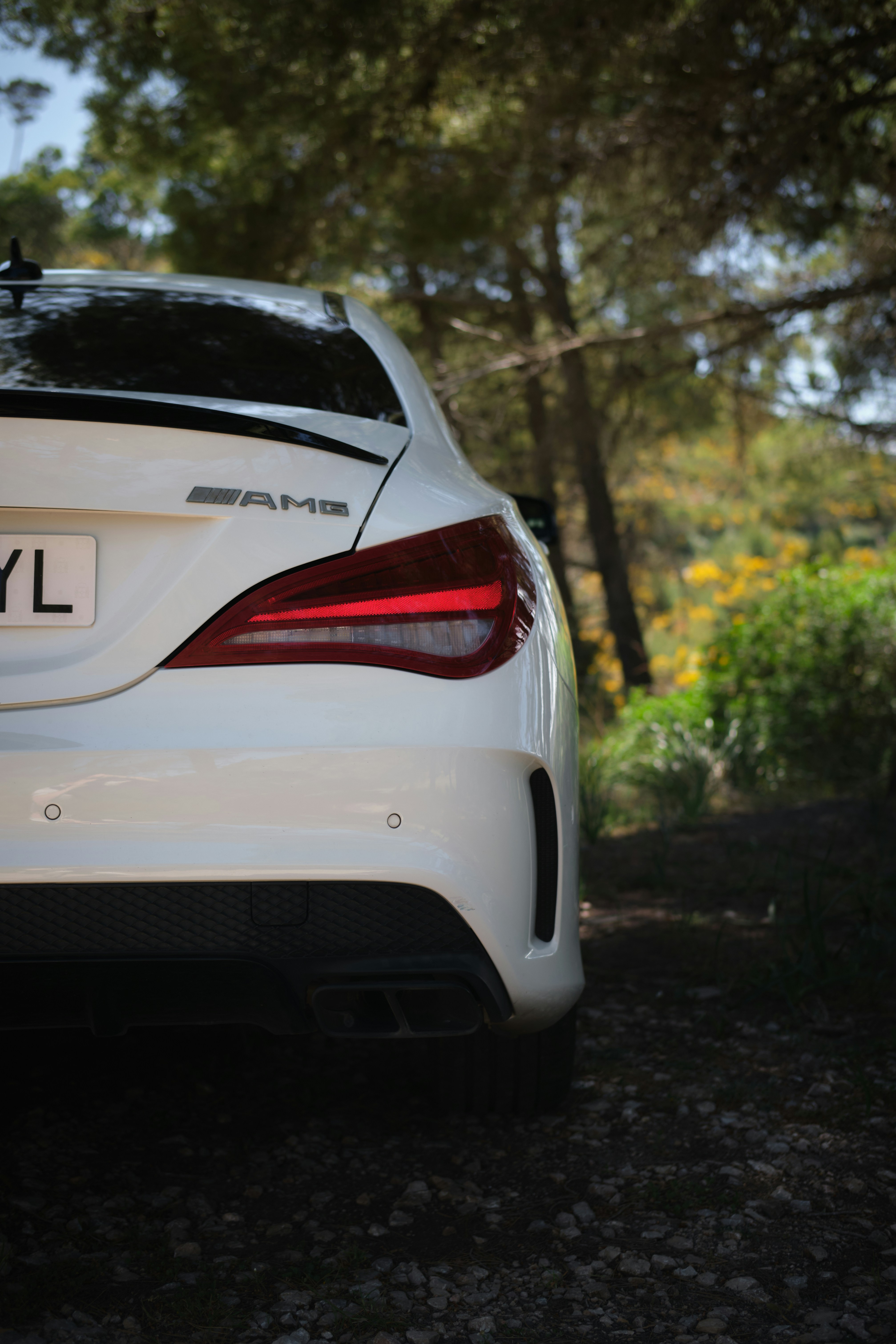 A white mercedes-benz amg is parked. photo – Free Wallpaper Image on ...