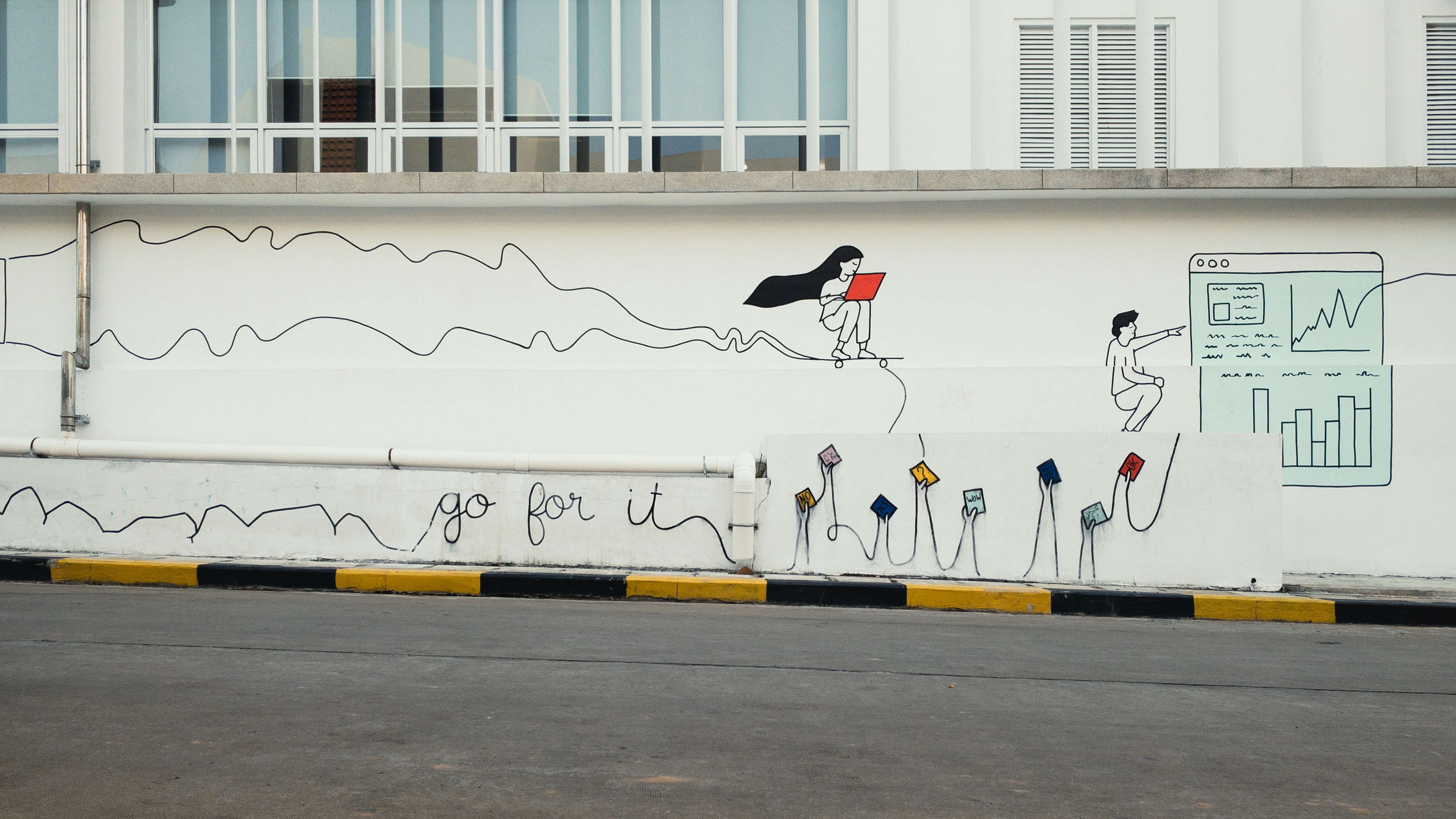 Mural depicts figures working with technology and graphs. photo – Free ...