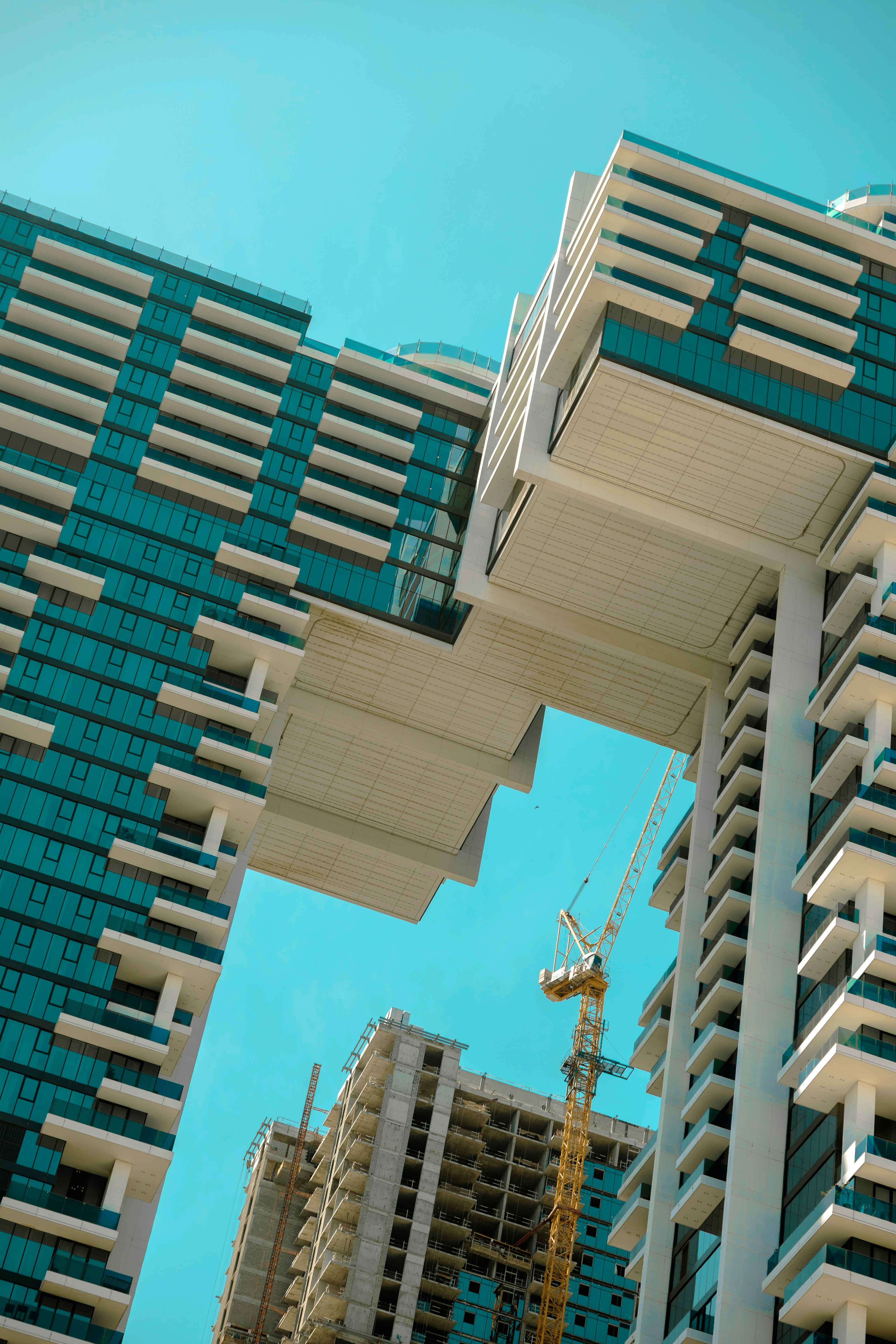 Modern buildings and construction under a blue sky. photo – Free ...