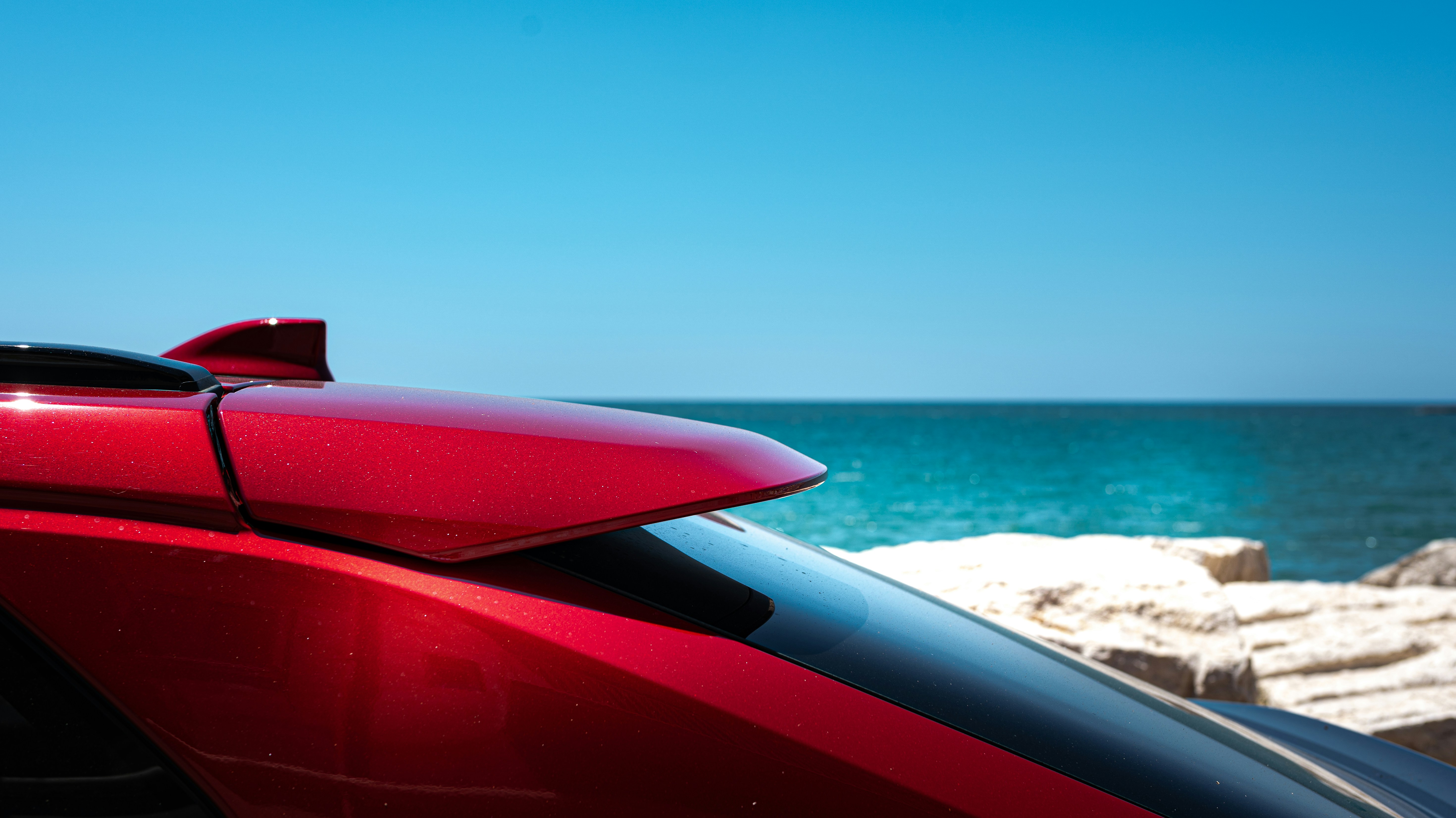 Red car roof overlooking the ocean and blue sky. photo – Free Wallpaper ...