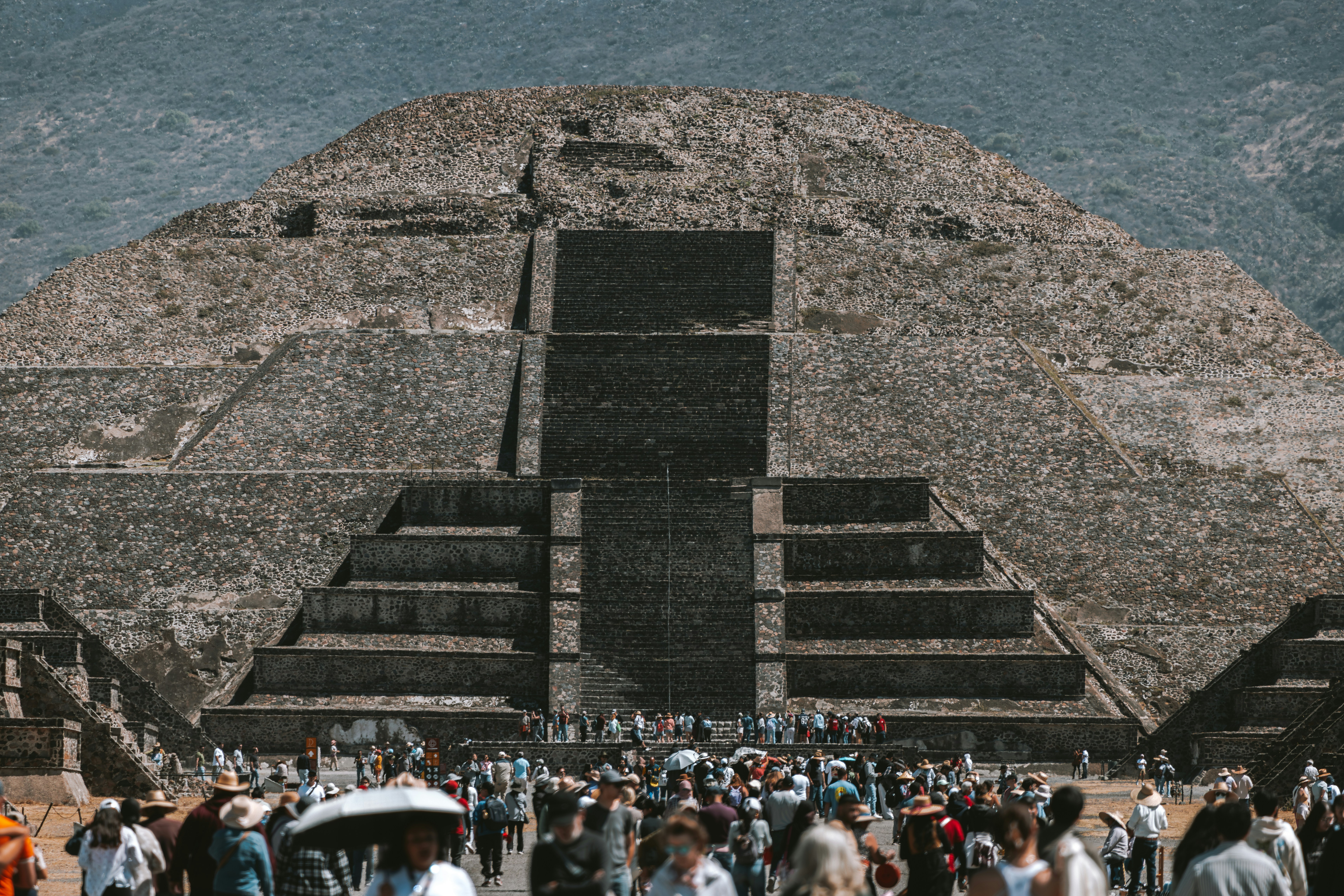 People explore the majestic pyramid of the sun.