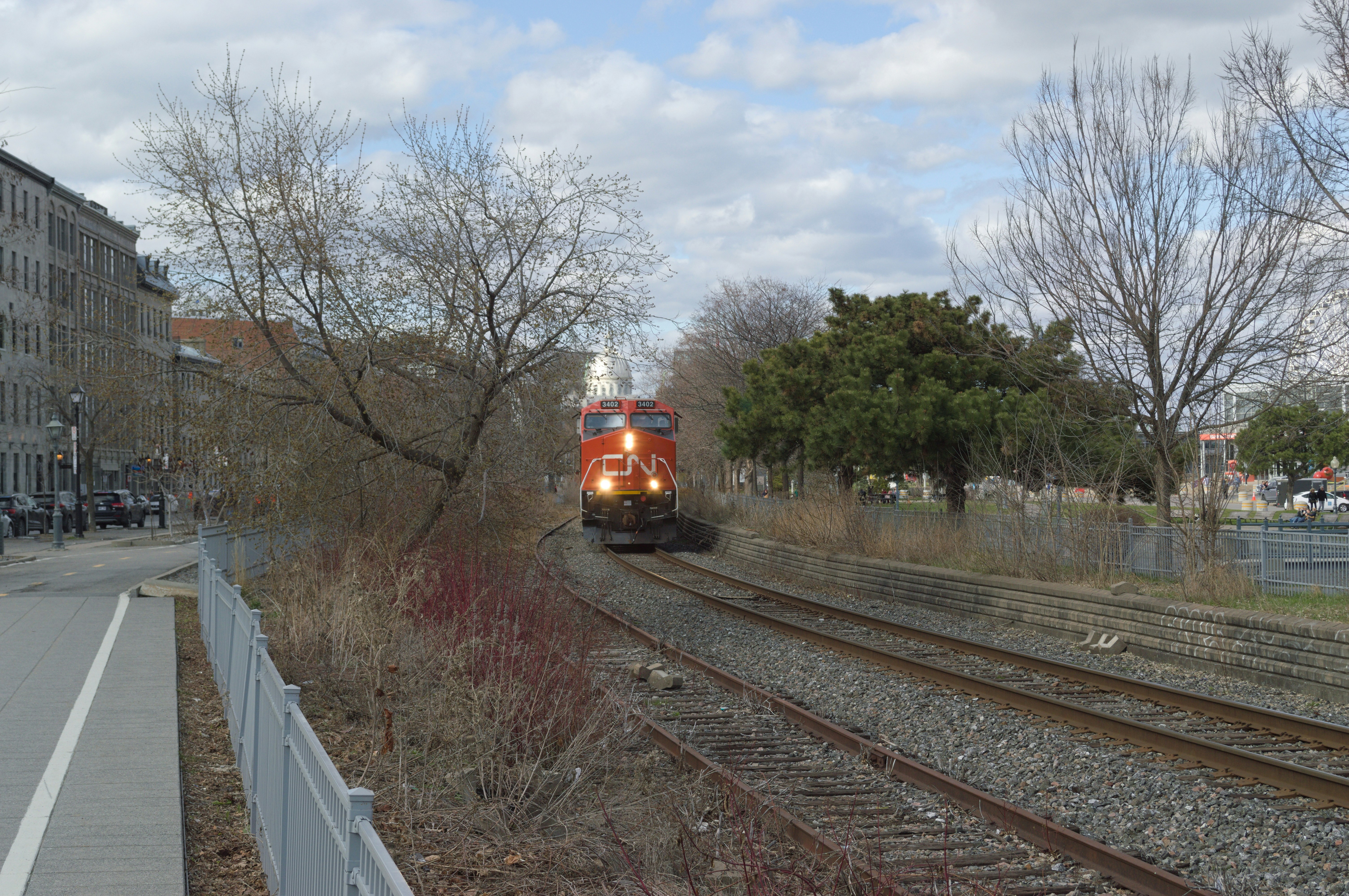 Red Engine at the Edge: A Quiet City Rail Moment