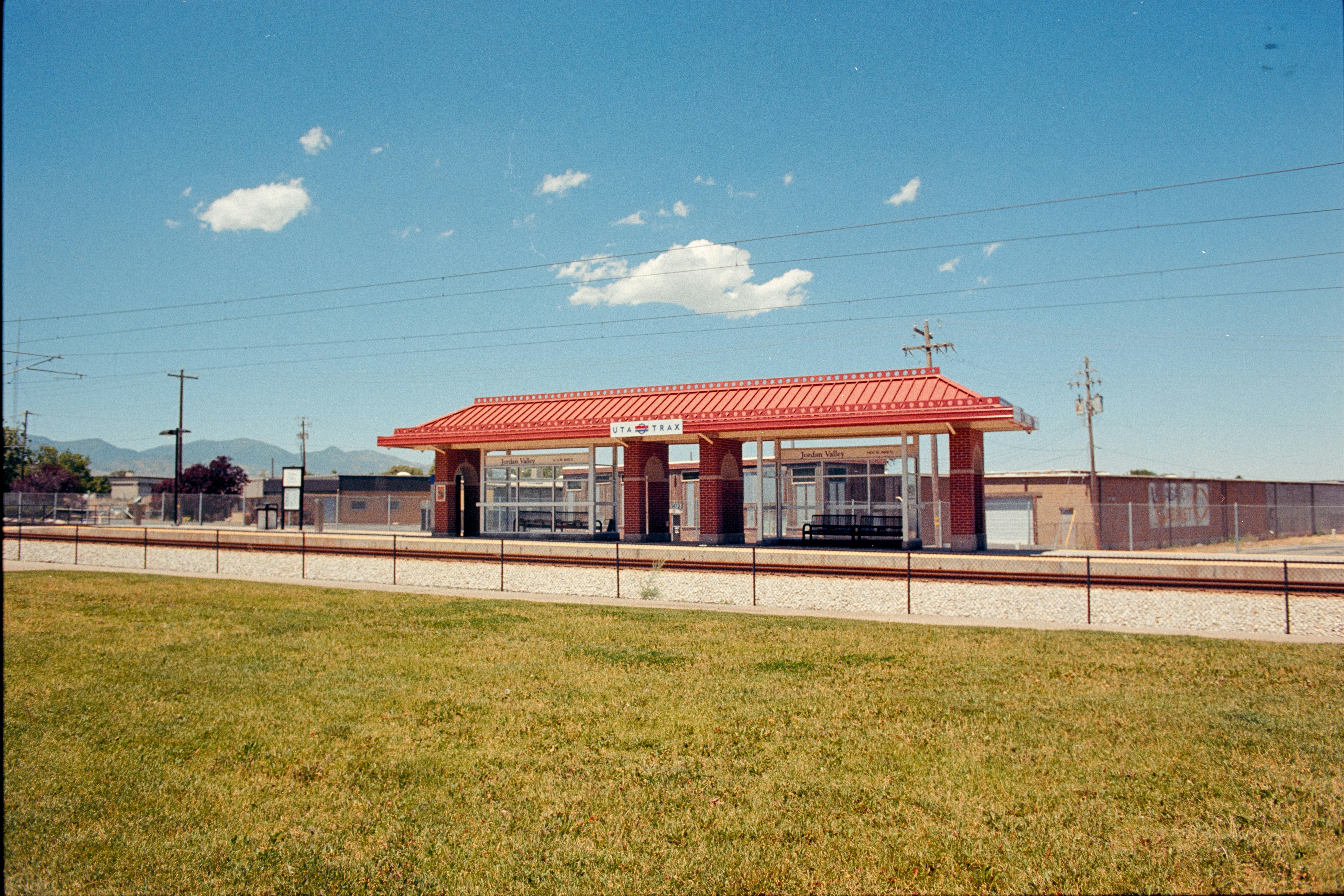 Terracotta Roof, Desert Station: A Quiet Moment on the Tracks