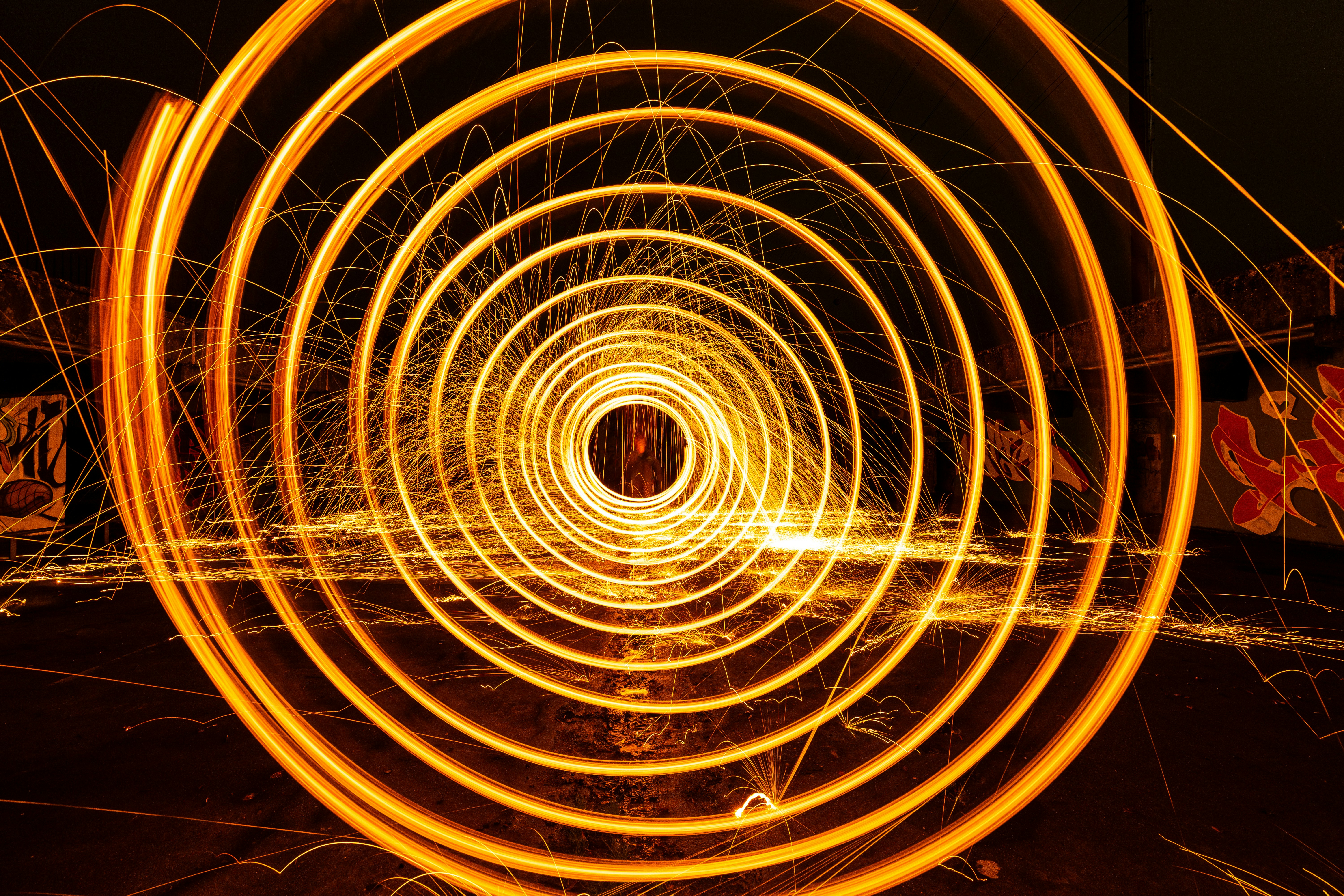 Glowing circular lights spin in a dark space. photo – Free Image on ...