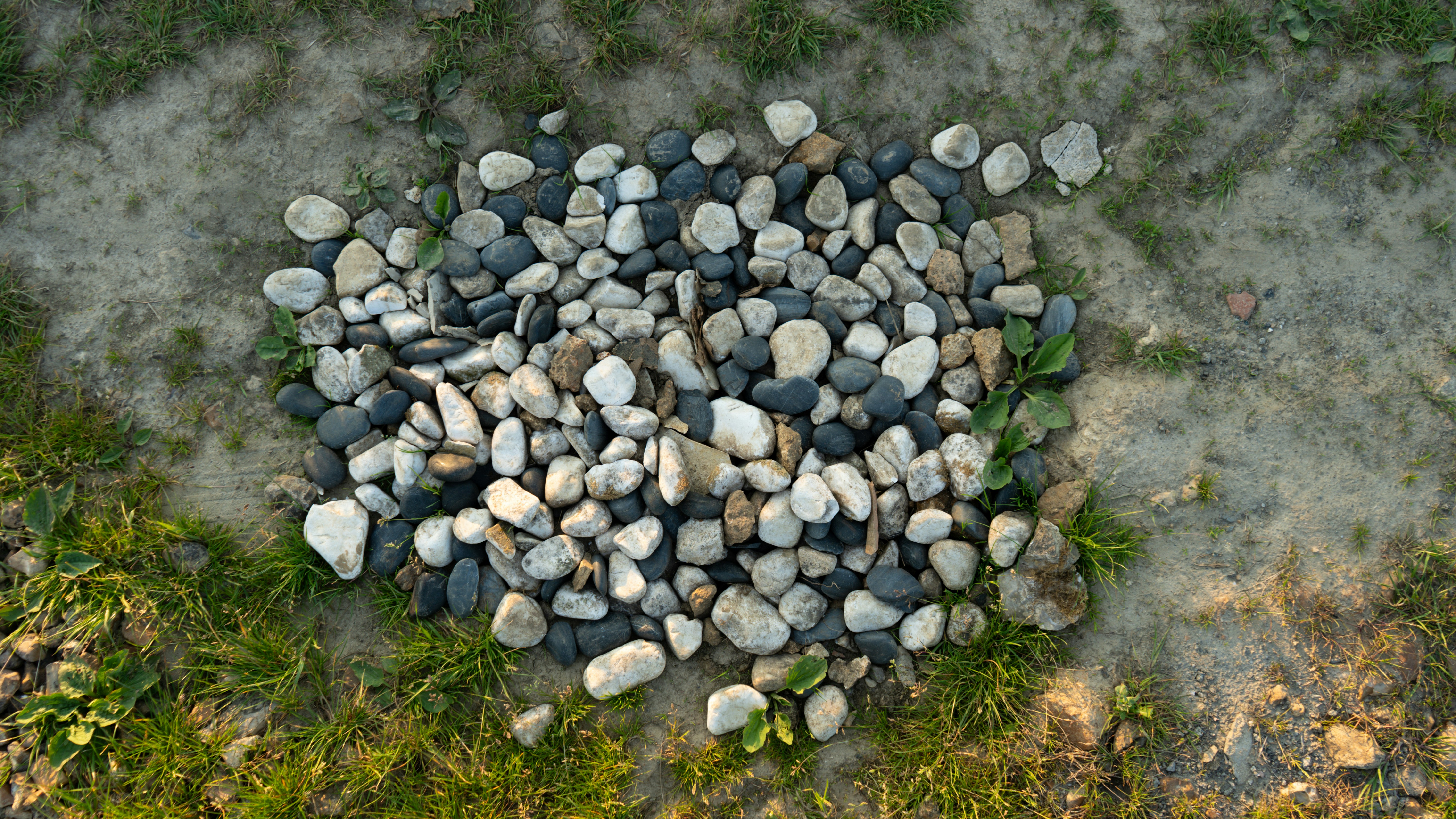 Pebble Ring in Parched Soil: An Aerial Rock Mosaic