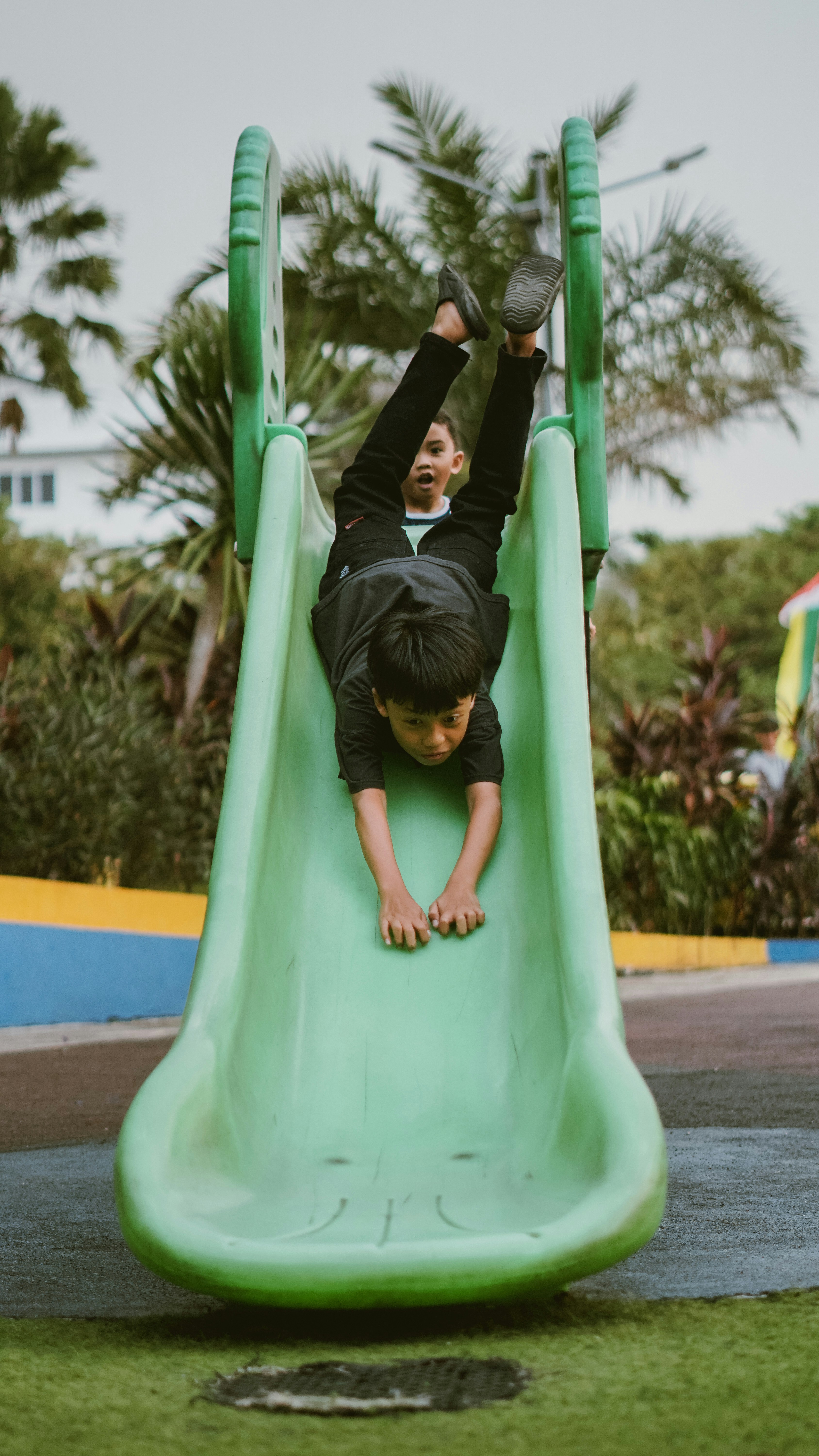 Gravity and Grins on a Bright Green Slide