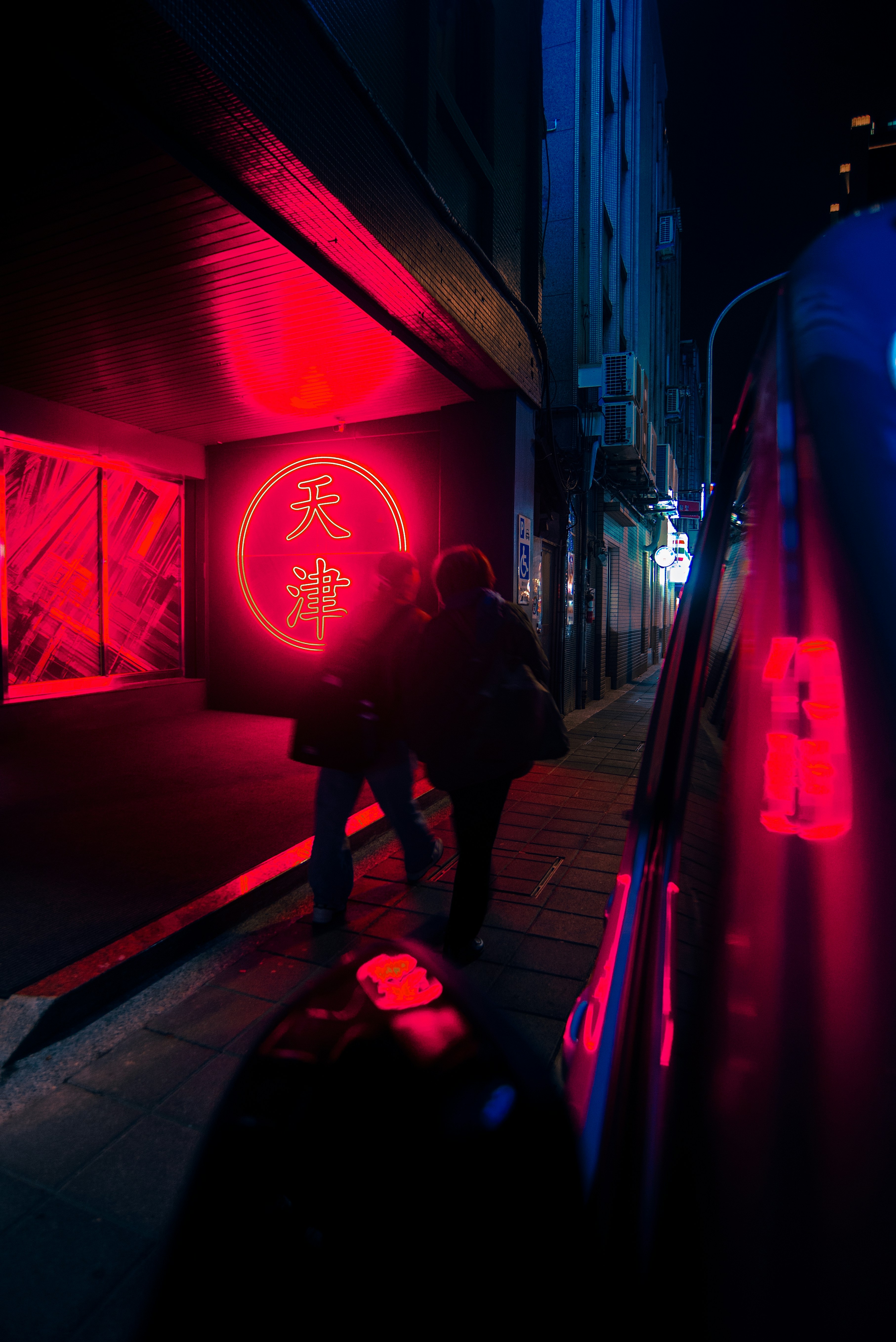 Neon lights illuminate a dark alley at night. photo – Free Street ...